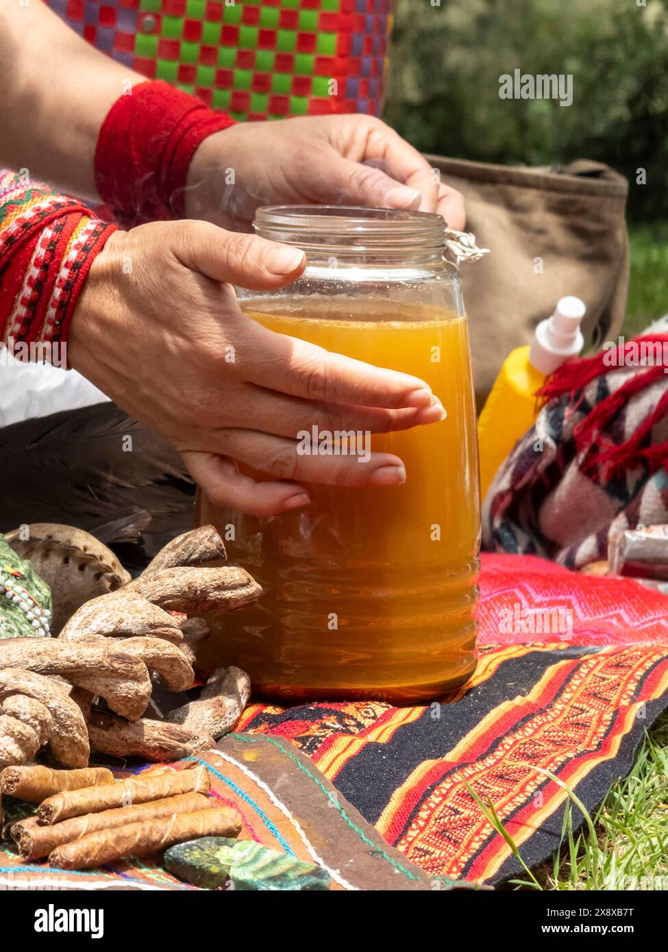 A Shaman who leads Ayahuasca ceremonies in Colombia blesses the sacred ...