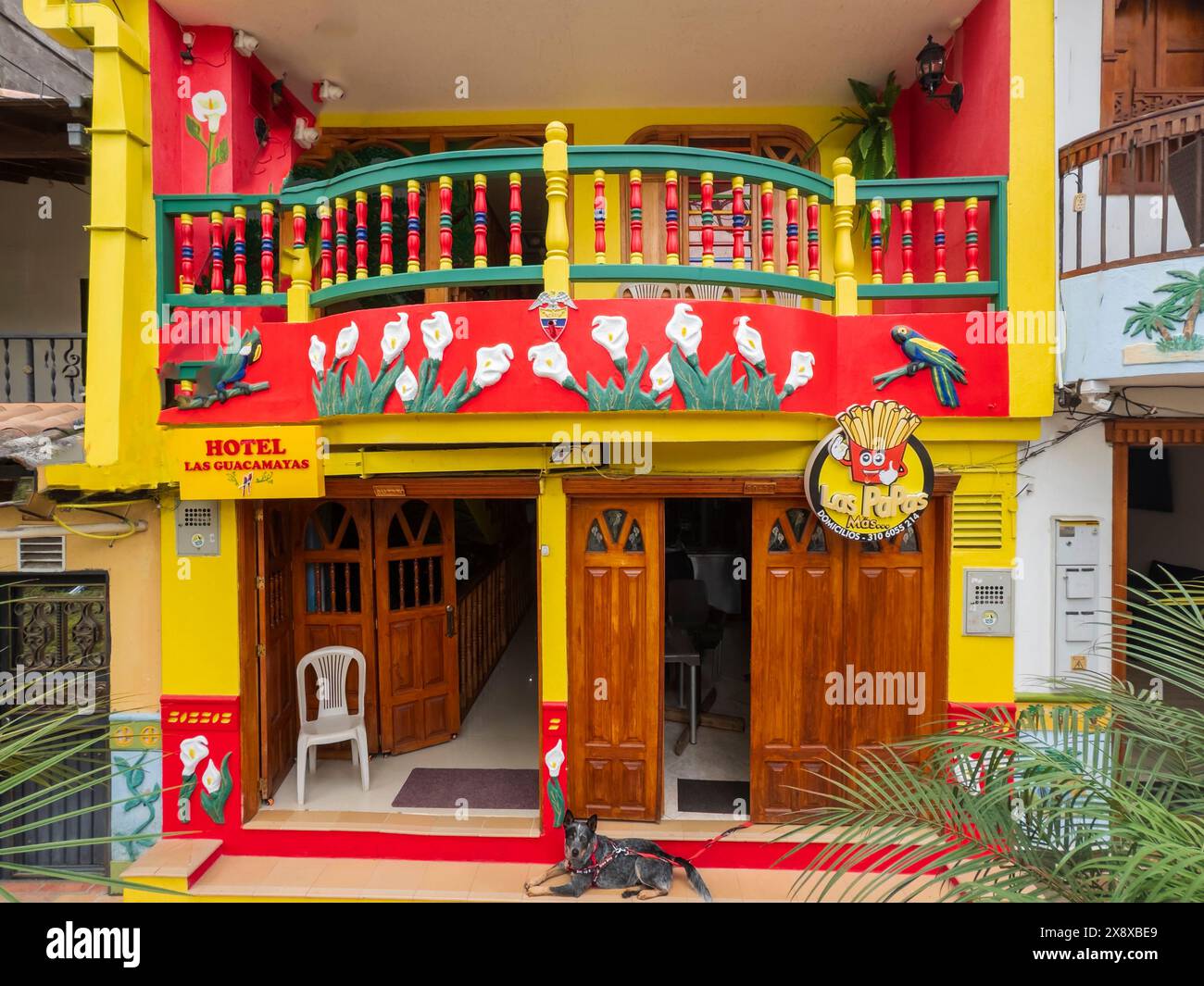 A sign in the small village painted colorfully anda big draw for those ...