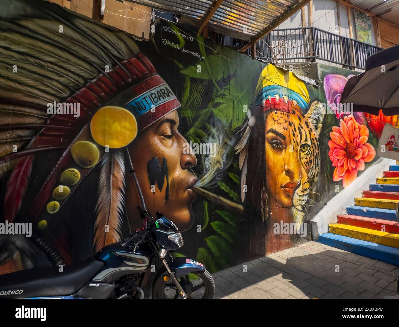 The murals in Comuna 13, a barrio in Medellin that was once quite ...