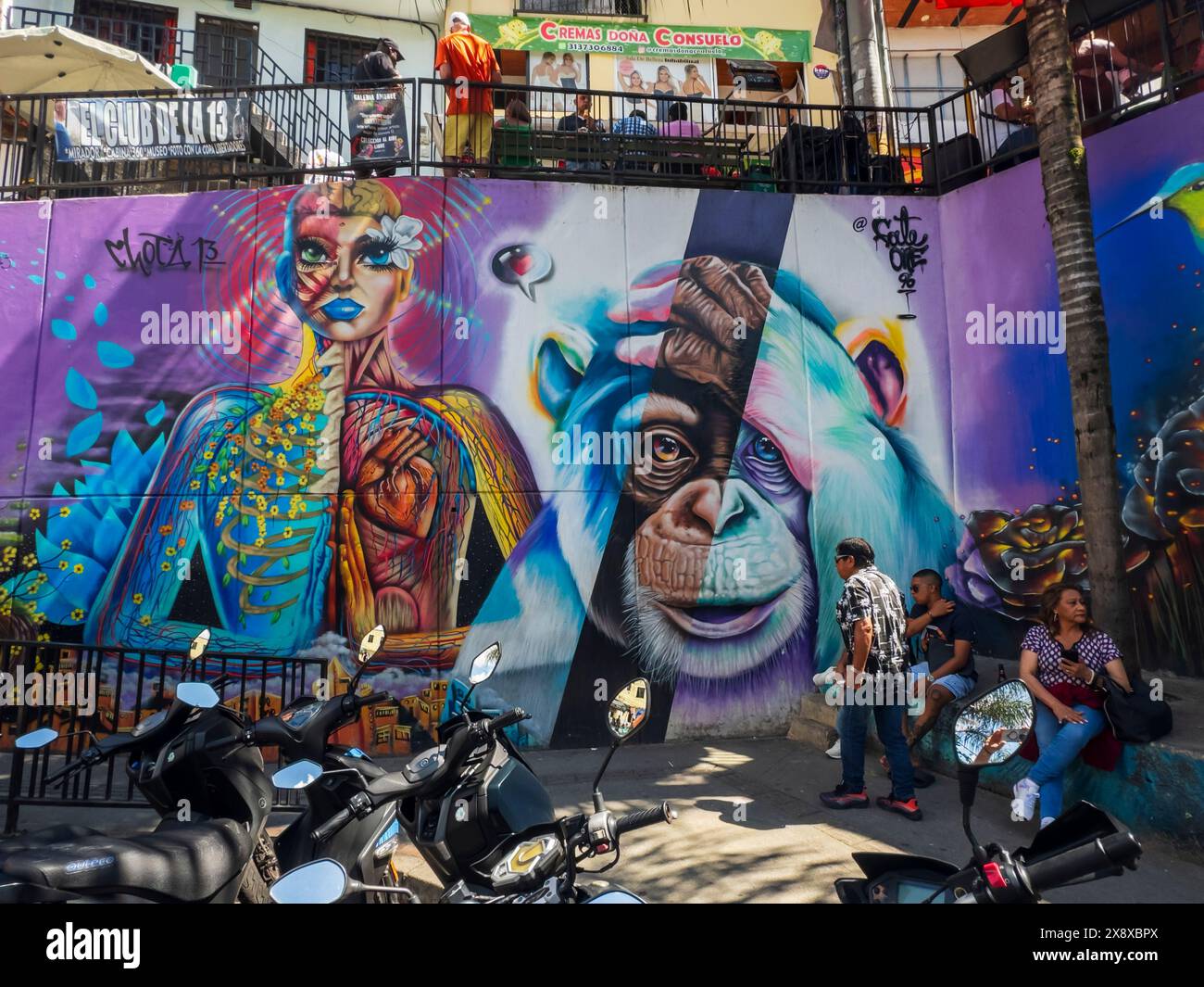 The murals in Comuna 13, a barrio in Medellin that was once quite ...