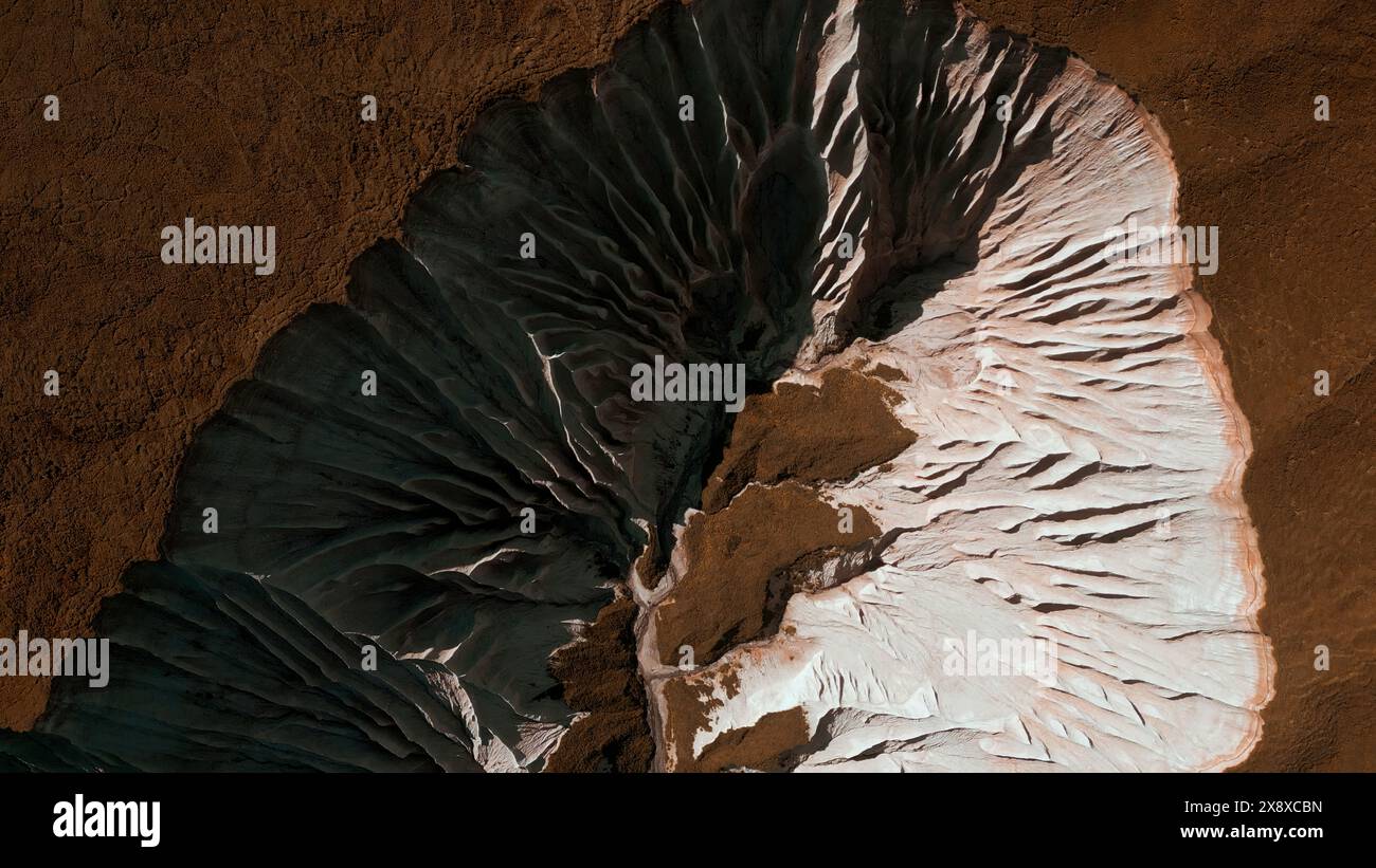 Aerial of wide gorge with rocky cliffs from both sides of small canyon ...