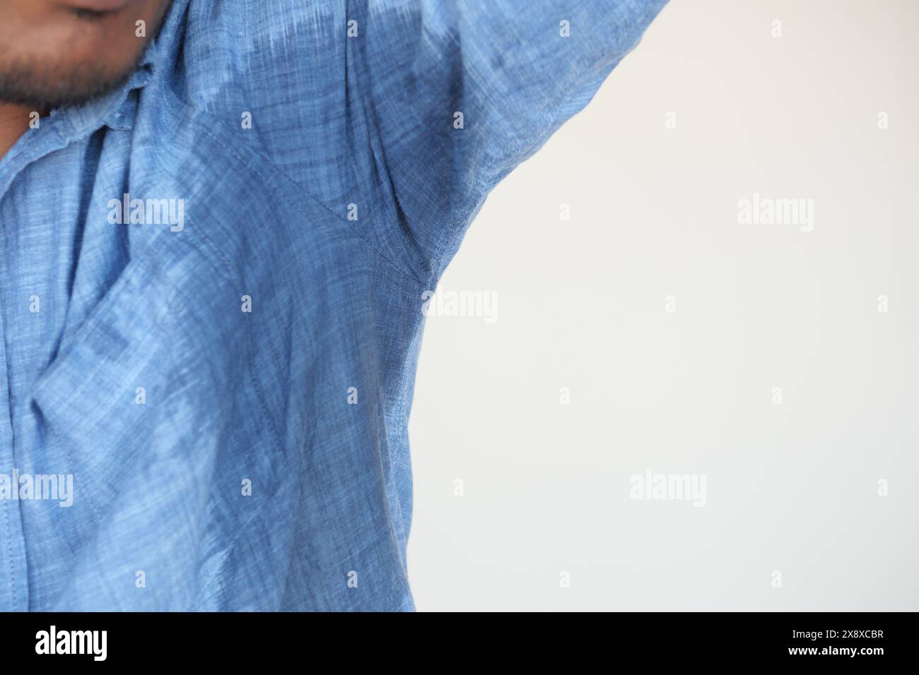 Smelling clothes armpit hi-res stock photography and images - Alamy