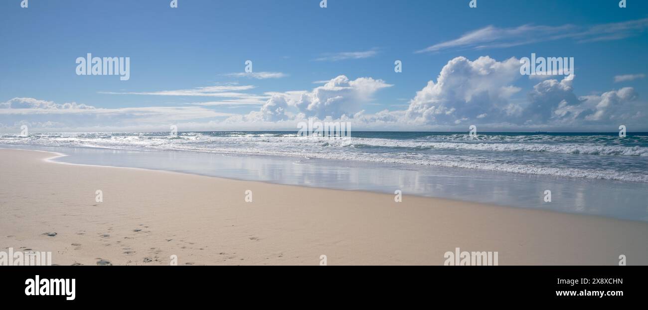 A sunny day beach scene in panorama view seascape landscape Stock Photo ...