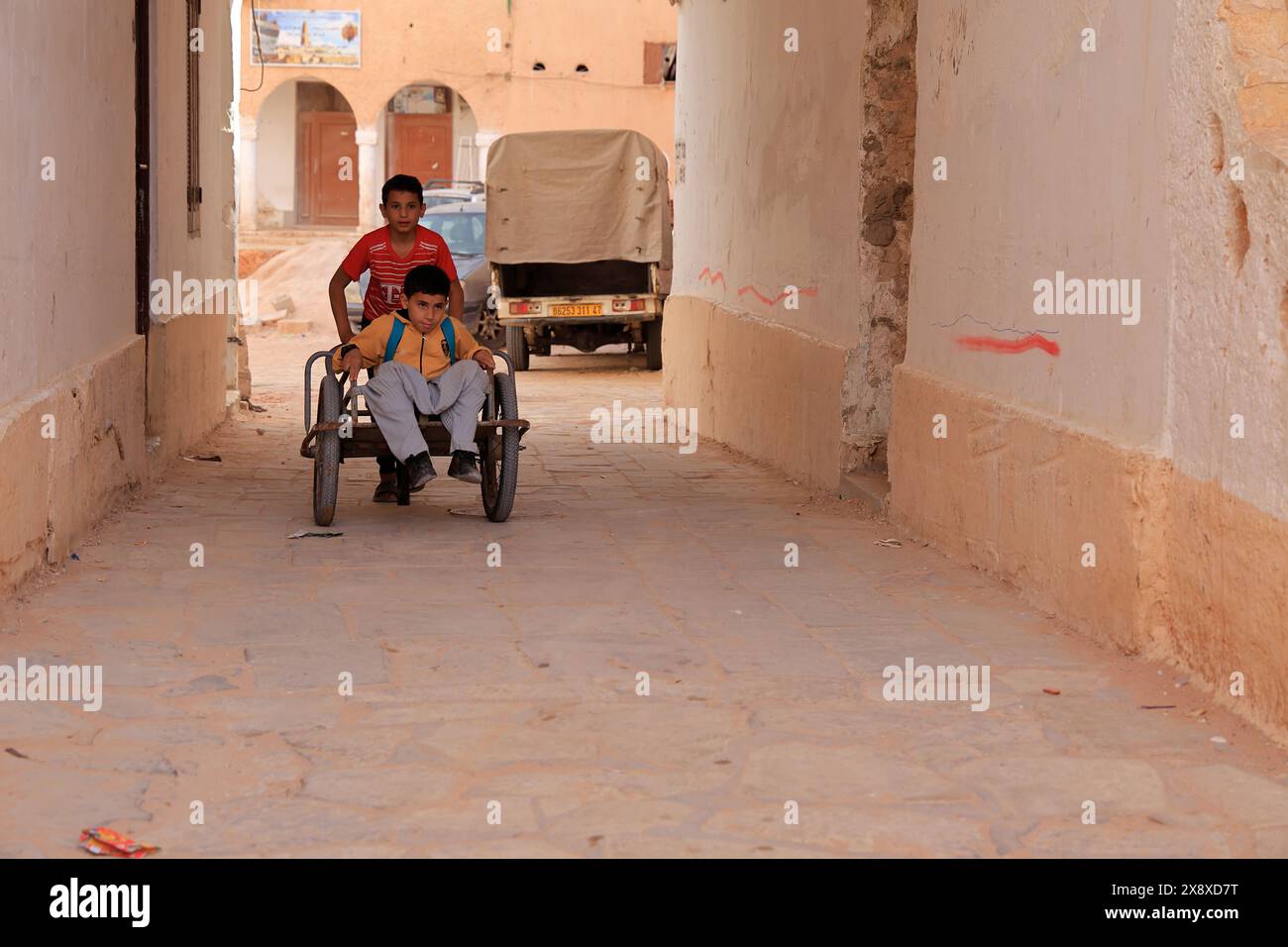 Children playing in the entrance of Ksar El Atteuf, one of the 5 Ksars ...