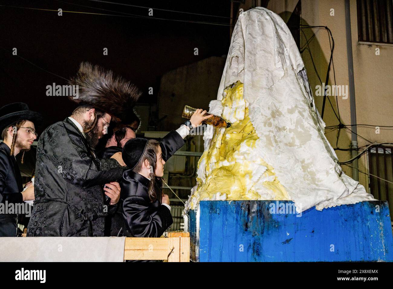 Preparations for the Lag Ba'omer bonfire ceremony in Lelov Hasidic ...
