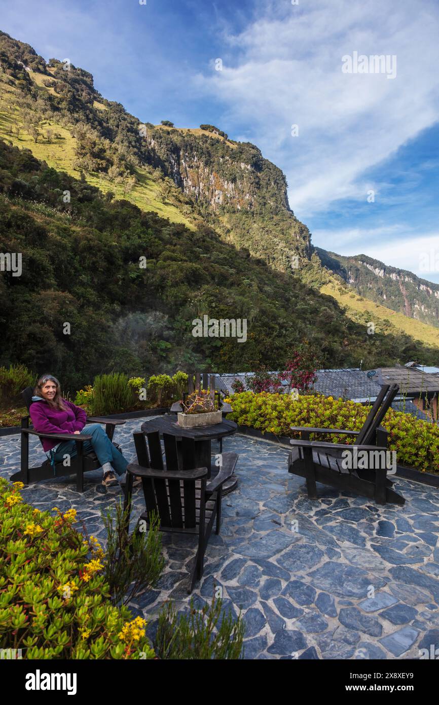A visitor enjoys the rooftop viewing platform at the Termales Del Ruiz ...