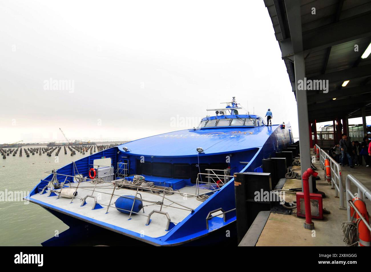Turbojet ferries to Macau docking at the Macau ferry terminal in Sheung ...