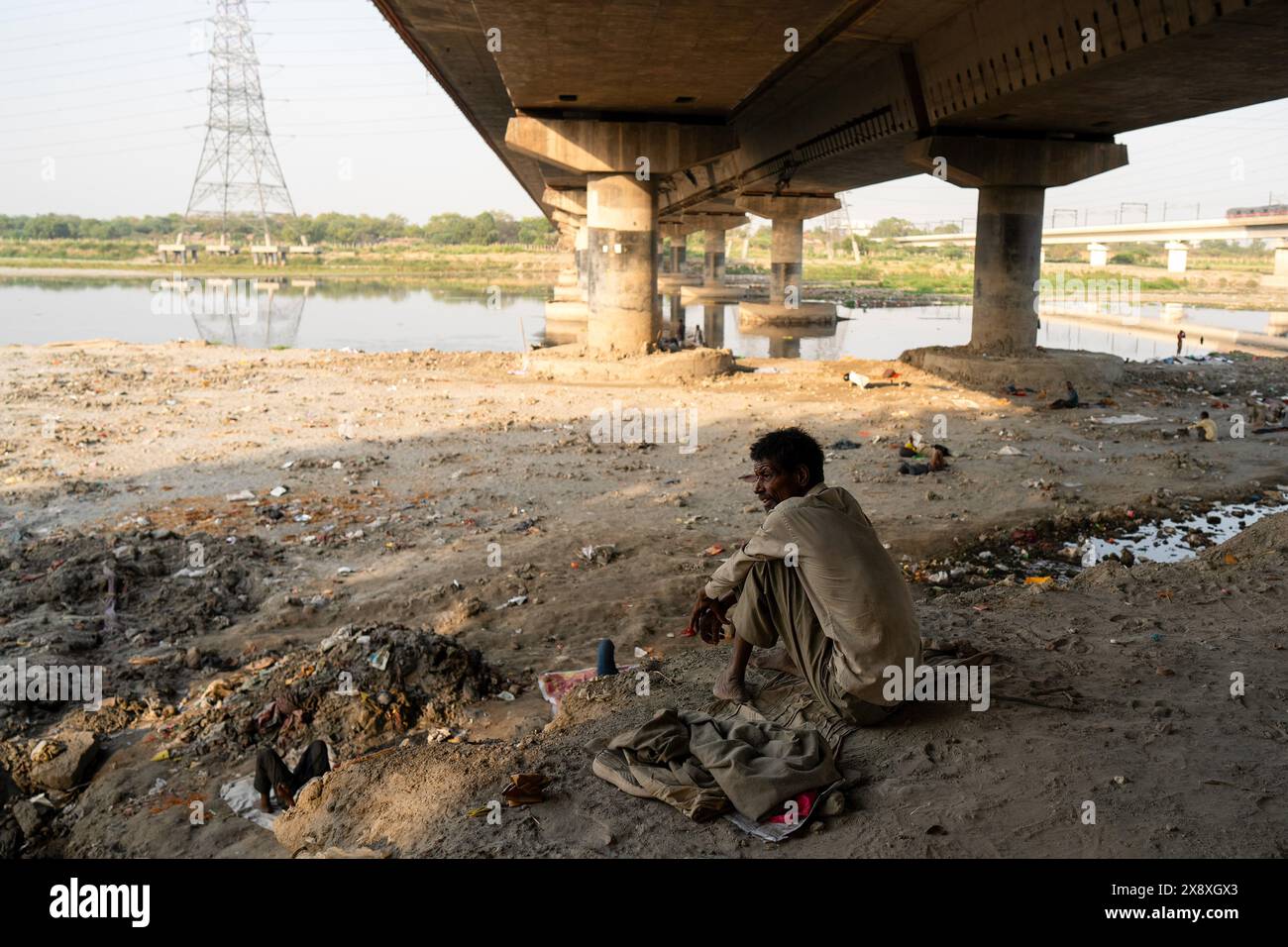 Man rests under bridge hi-res stock photography and images - Alamy