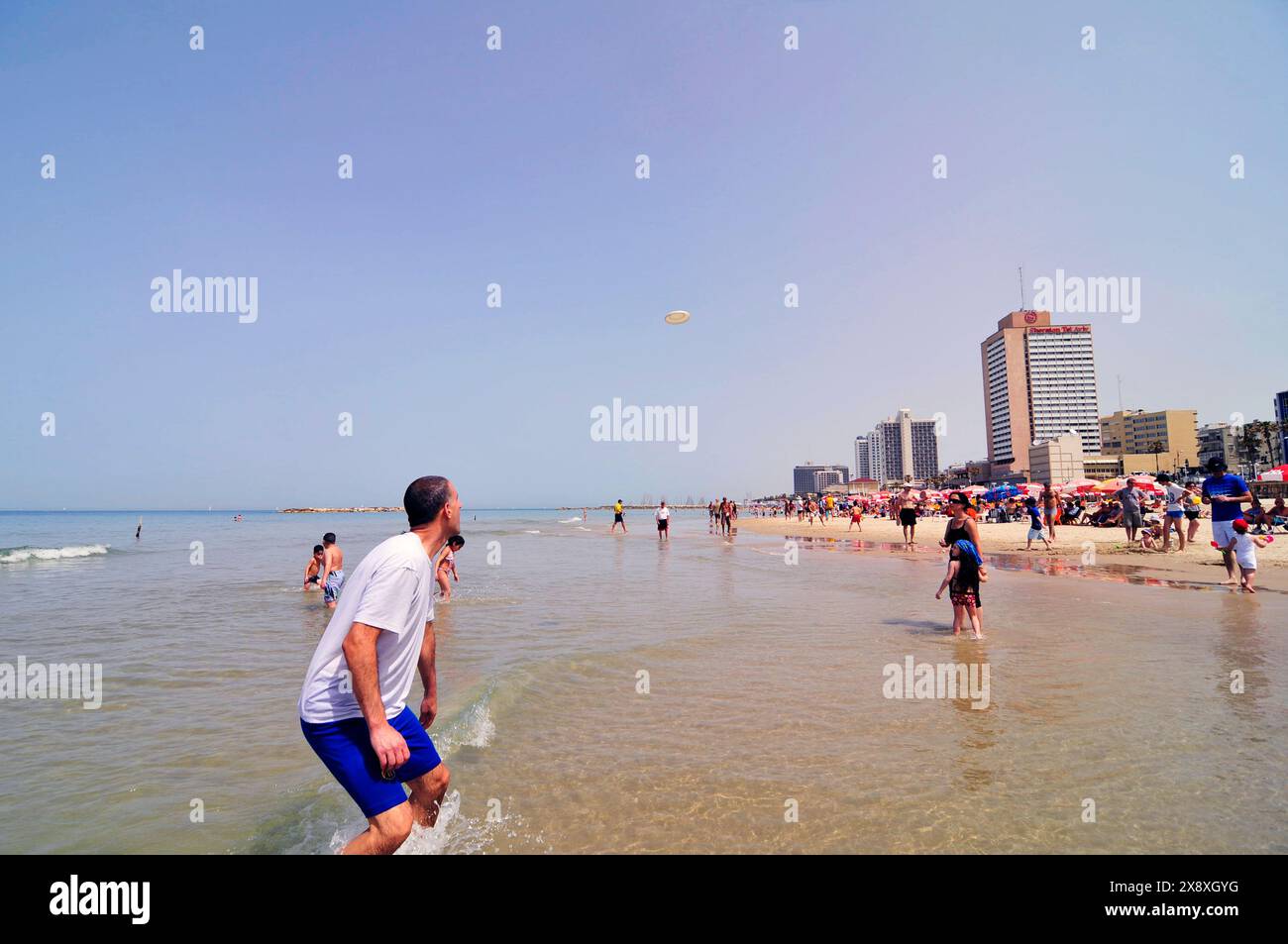 Israeli men playing Matkot on the beach in Tel-Aviv, Israel Stock Photo ...