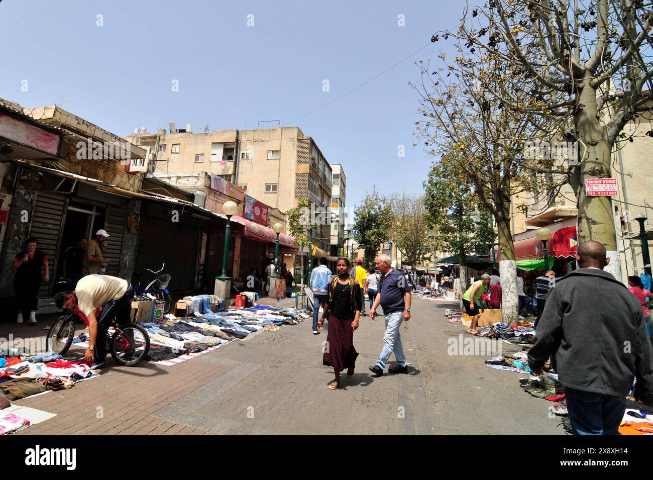 Neve Sha'anan Street, is a pedestrian mall. Many foreign workers ...