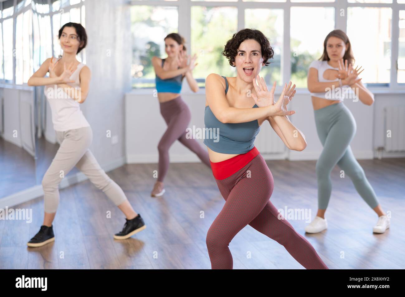 Female teacher conducts modern dance lessons for group of girls Stock ...
