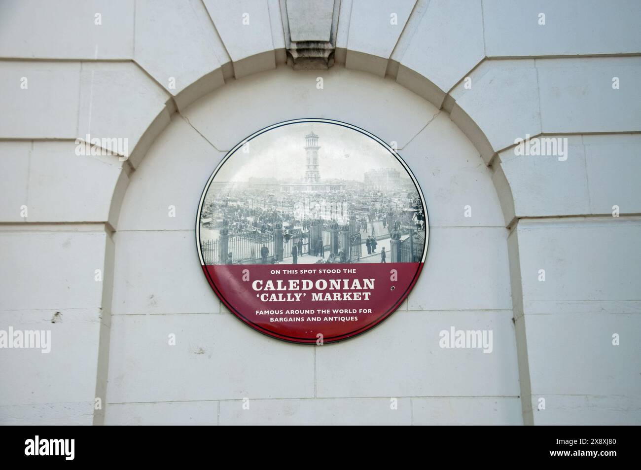 Plaque indicating the site of the Metropolitan Meat Market, The Clock ...
