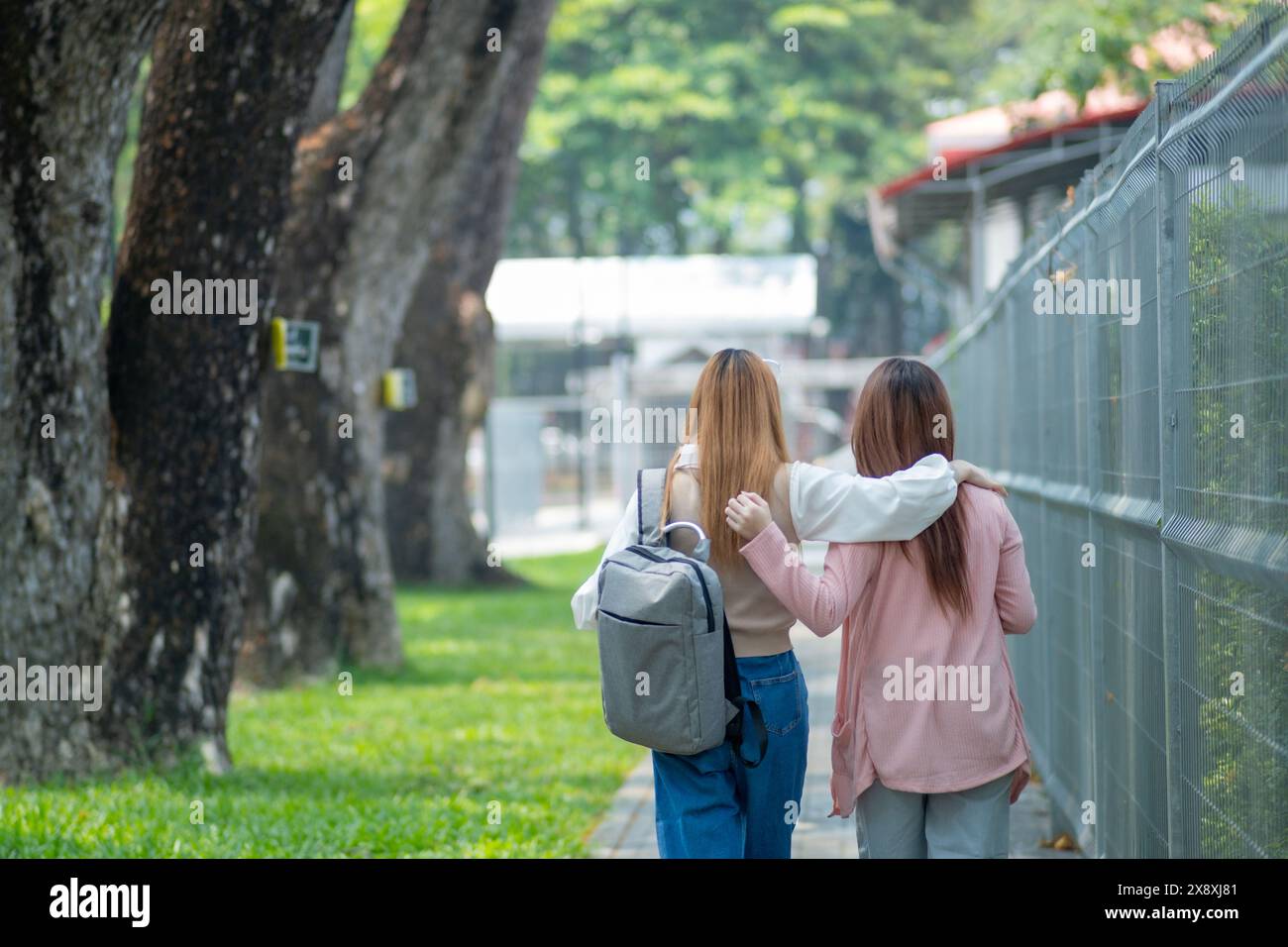 College students walking together outdoors, Group of happy friend ...
