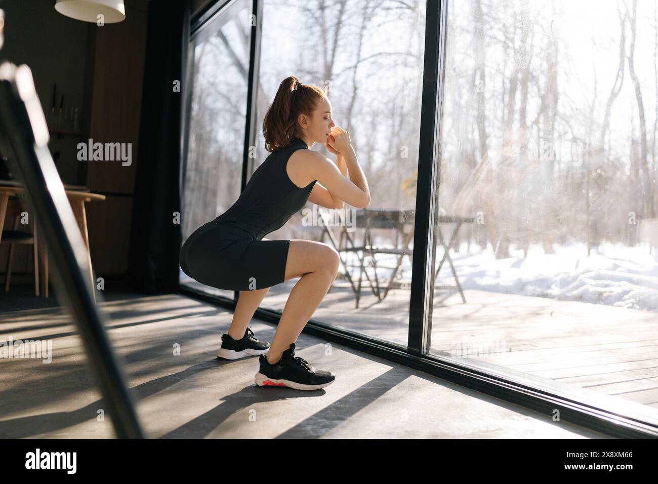 Woman squats rear view hi-res stock photography and images - Alamy