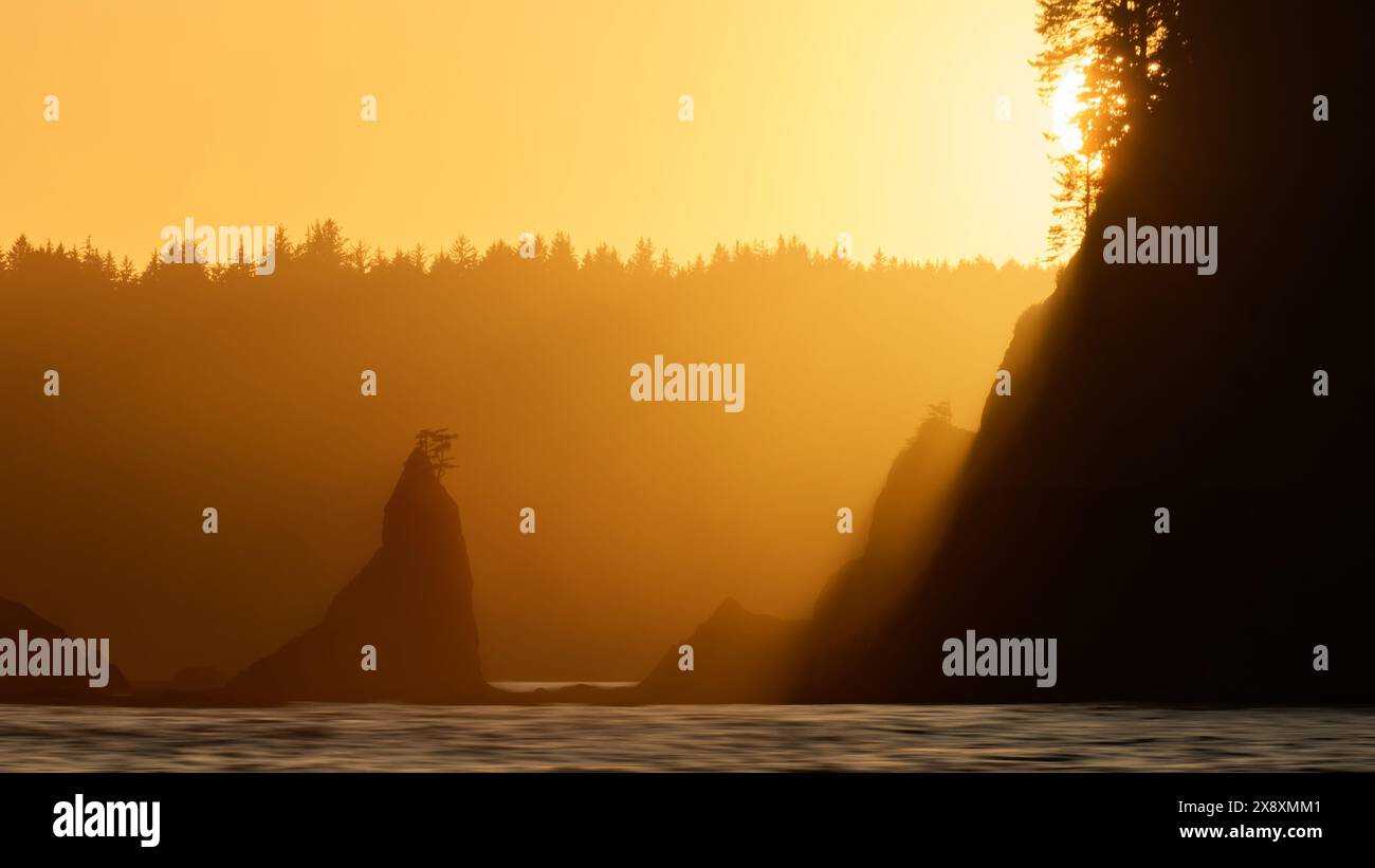 Sea stack below Scotts Bluff at sunset, South Coast Beach Trail ...