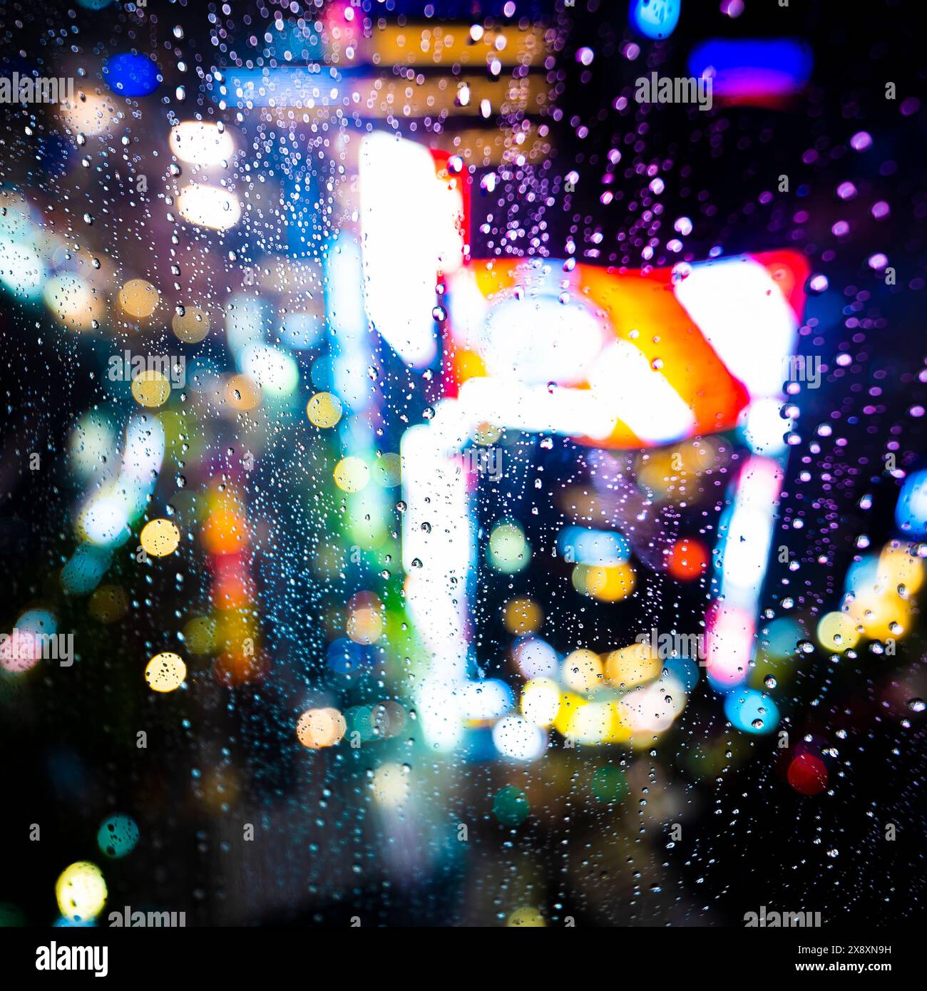 Rainy night in downtown hi-res stock photography and images - Alamy