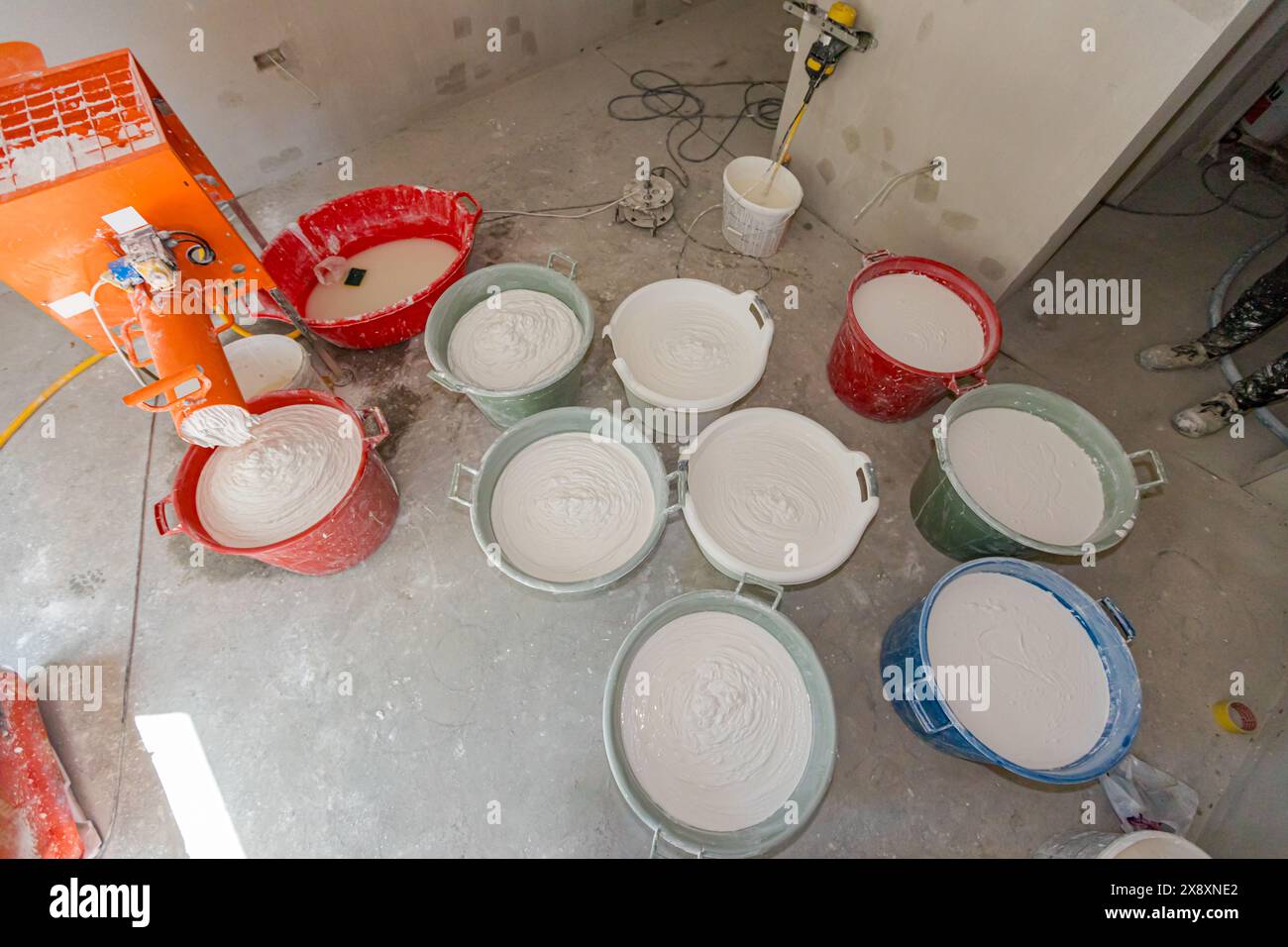 Electric mixer for mixes dry white putty, stir plaster and water in a ...