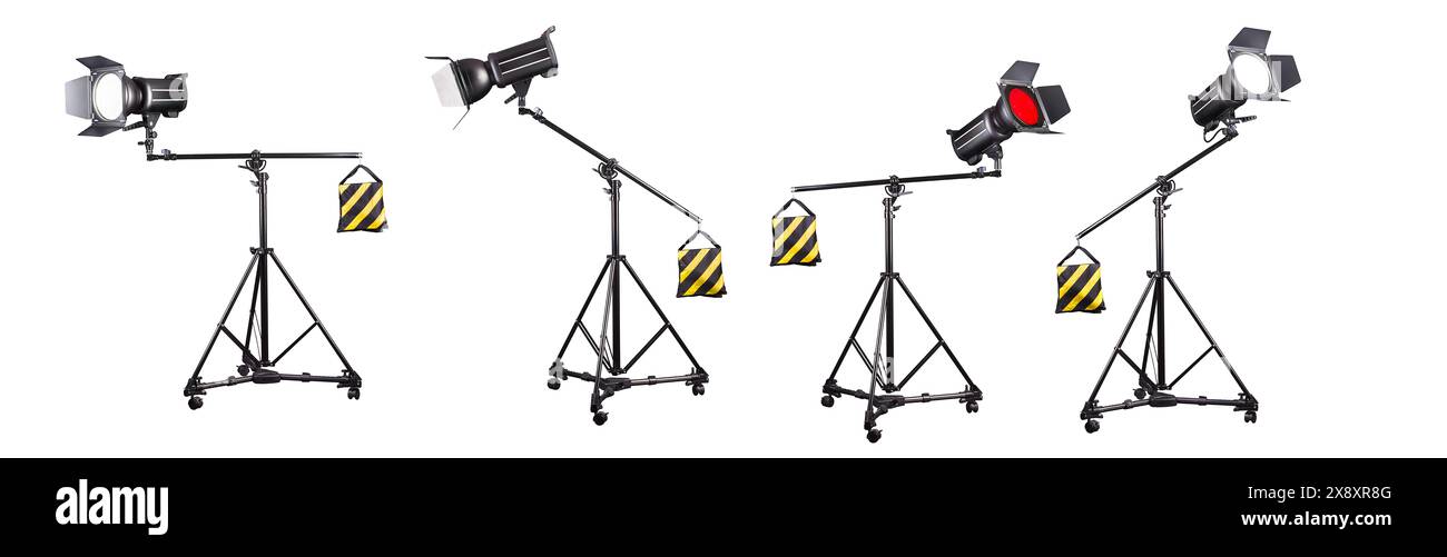 Photography studio flash on a lighting stand isolated on white ...