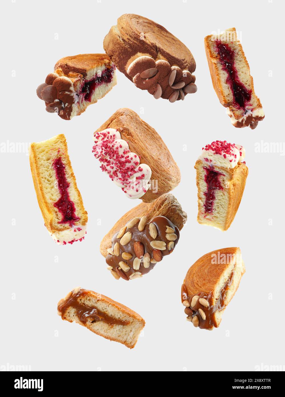 Delicious round croissants in air on white background. Puff pastry ...