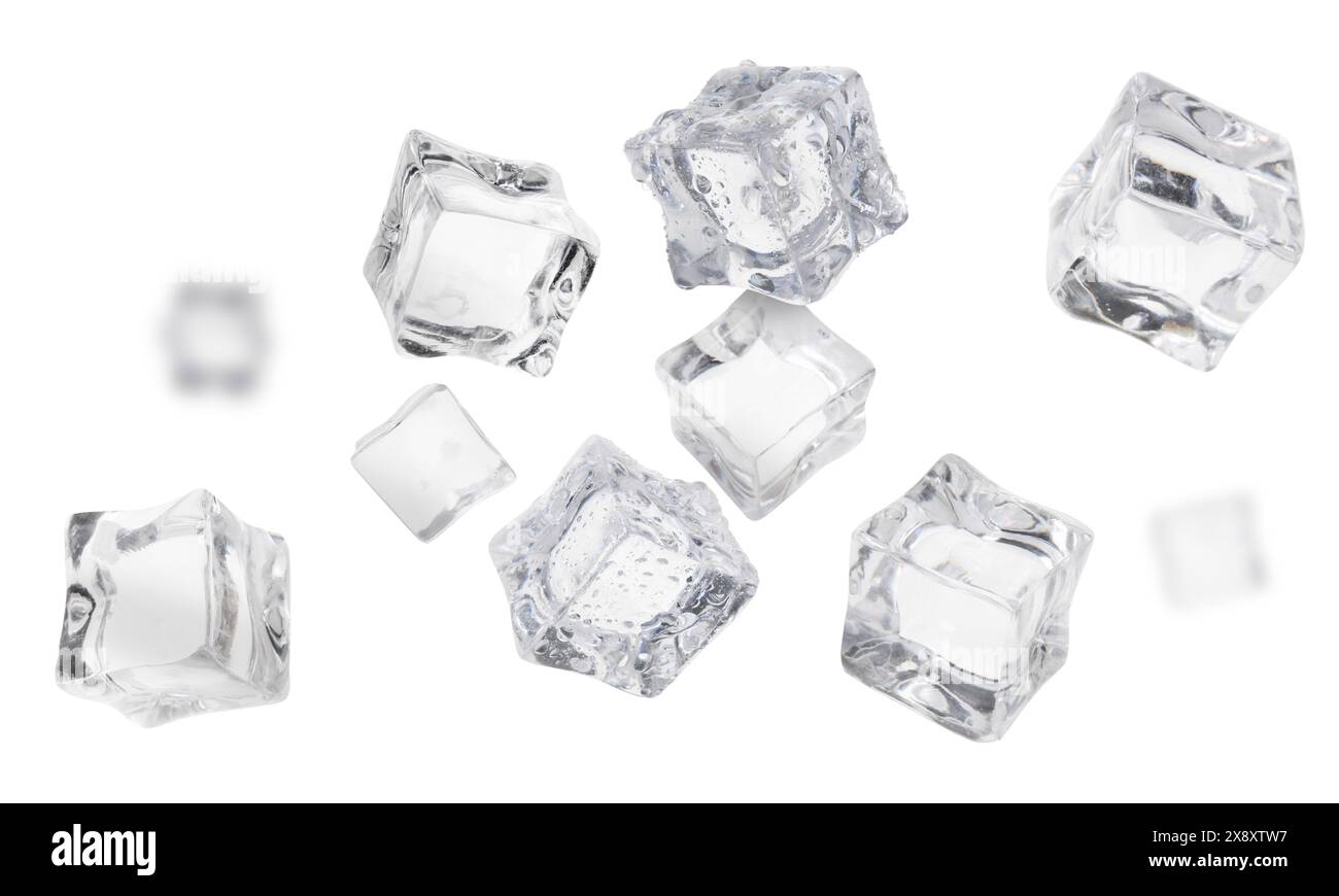 Many ice cubes in air on white background Stock Photo - Alamy