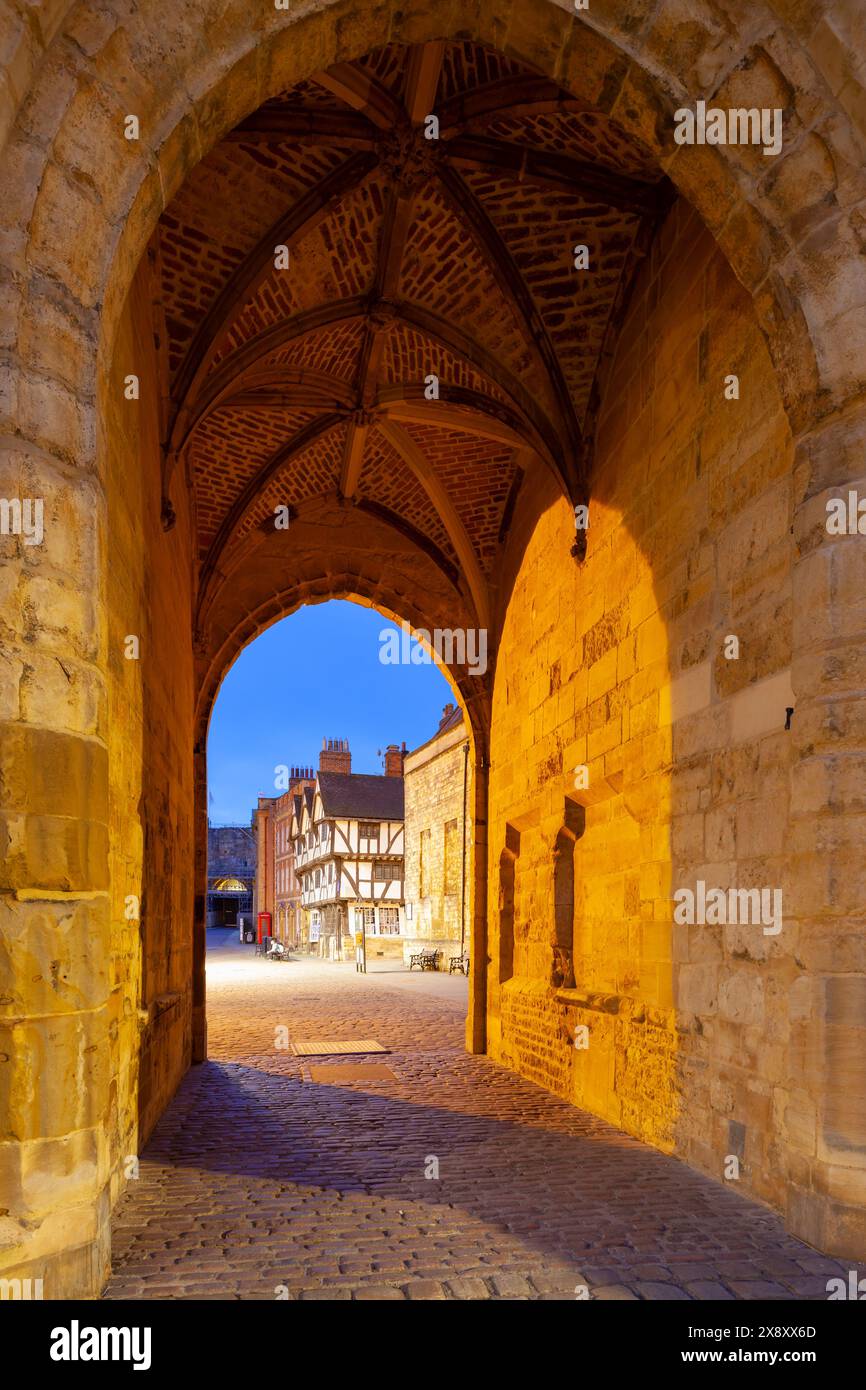 Night falls at the Exchequer Gate in Lincoln, England Stock Photo - Alamy