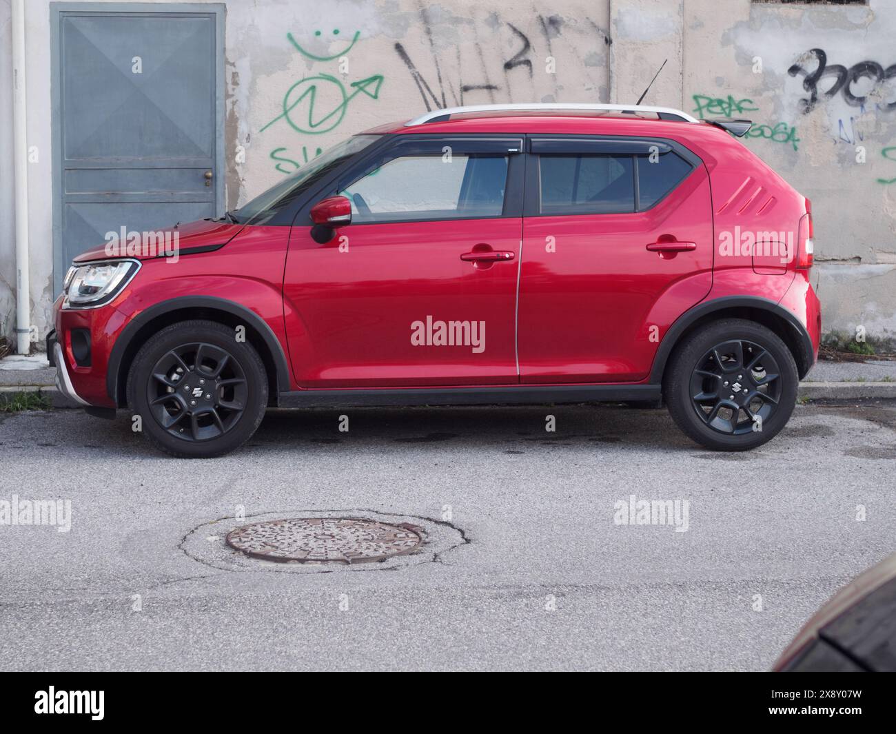 Cremona, Italy - May 15th 2024 Suzuki Vibrant red compact suv parked ...