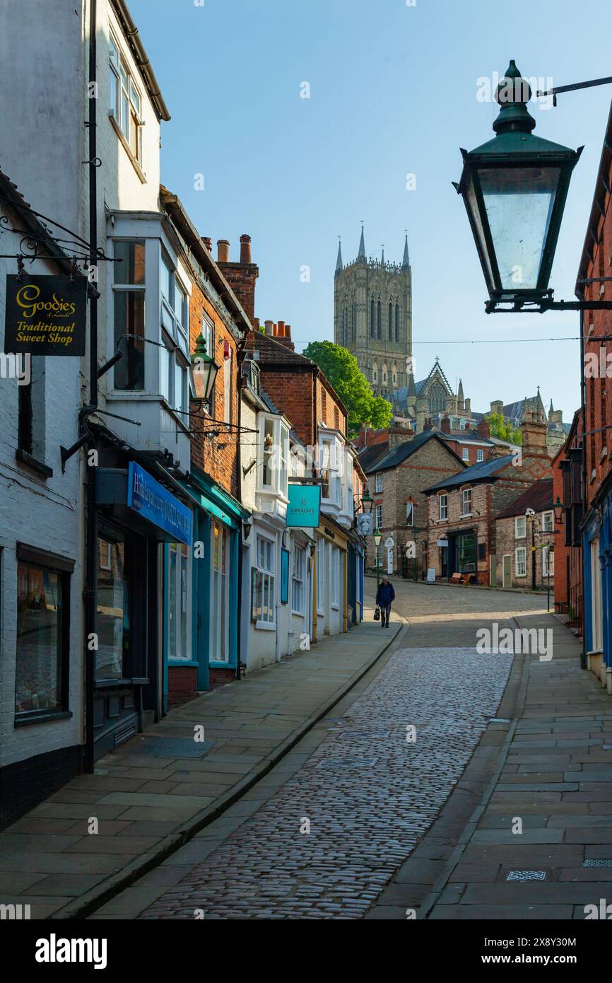 Spring morning on Steep Hill in Lincoln, England. Looking up towards ...