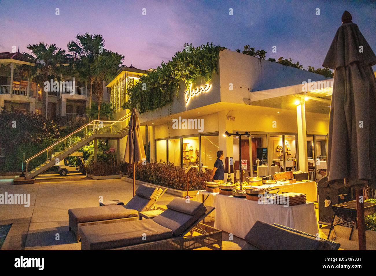 View of rooftop bar at sunset in Cape Panwa beach in Phuket, Thailand ...