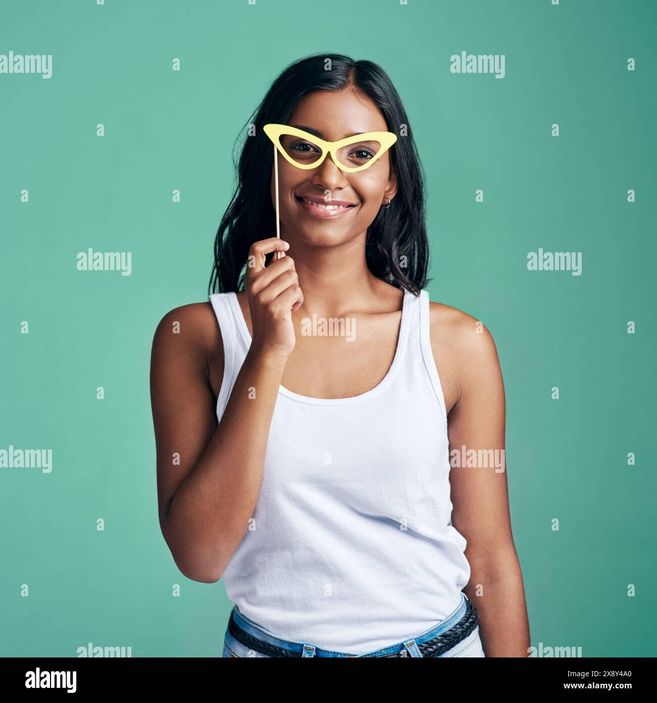 Girl, gen z and portrait with glasses in studio on green background for ...