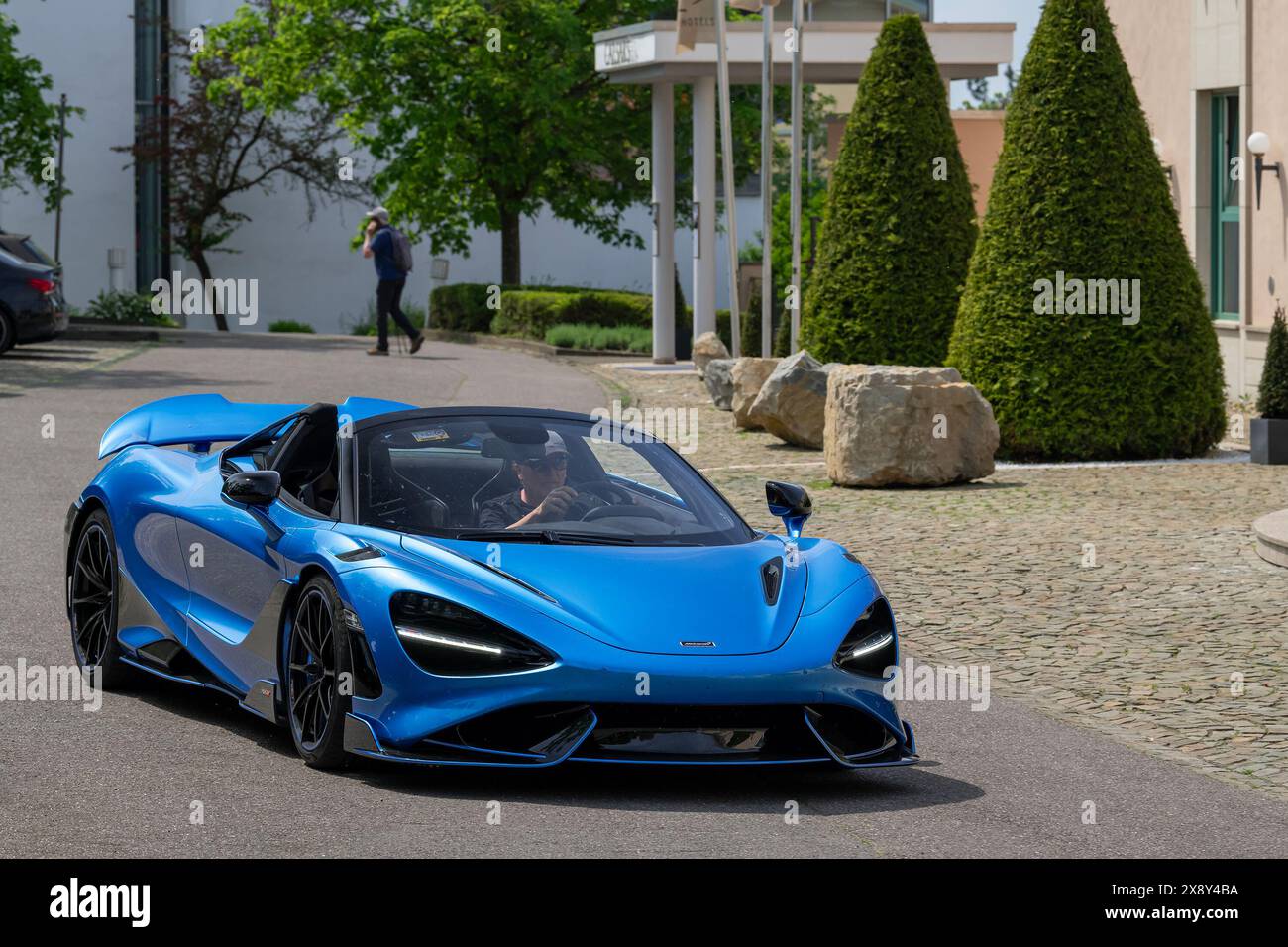Perl, Germany - View on a blue McLaren 765LT Spider parked on a street ...