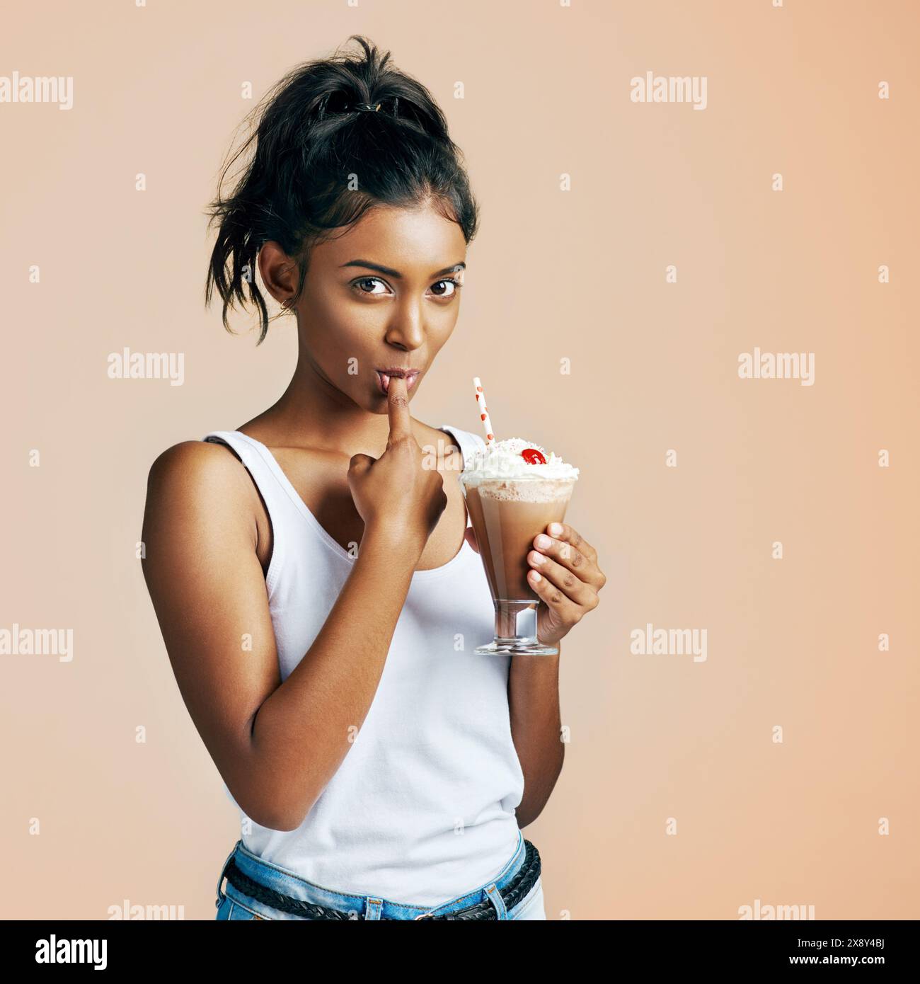Woman, smile and milkshake in studio portrait, summer and chocolate ...