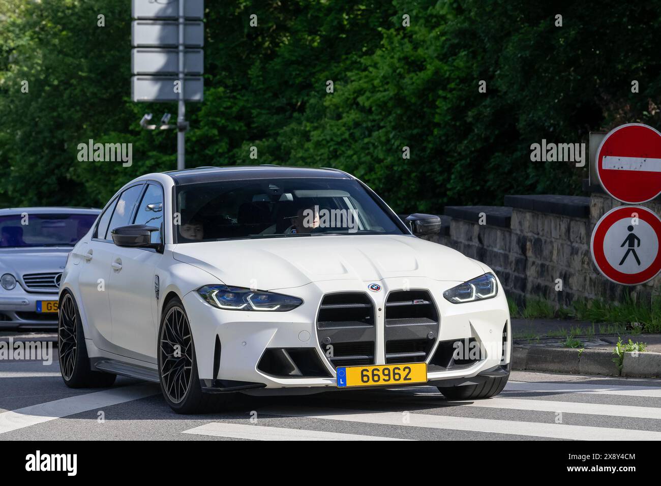 Luxembourg City, Luxembourg - View on a matte white BMW M3 Competition ...
