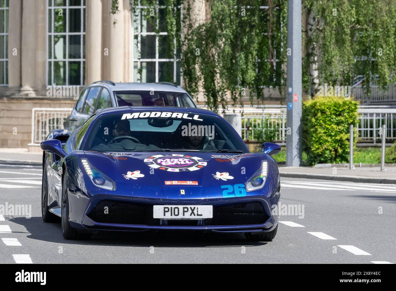 Luxembourg City, Luxembourg - View on a blue Ferrari 488 GTB driving on ...