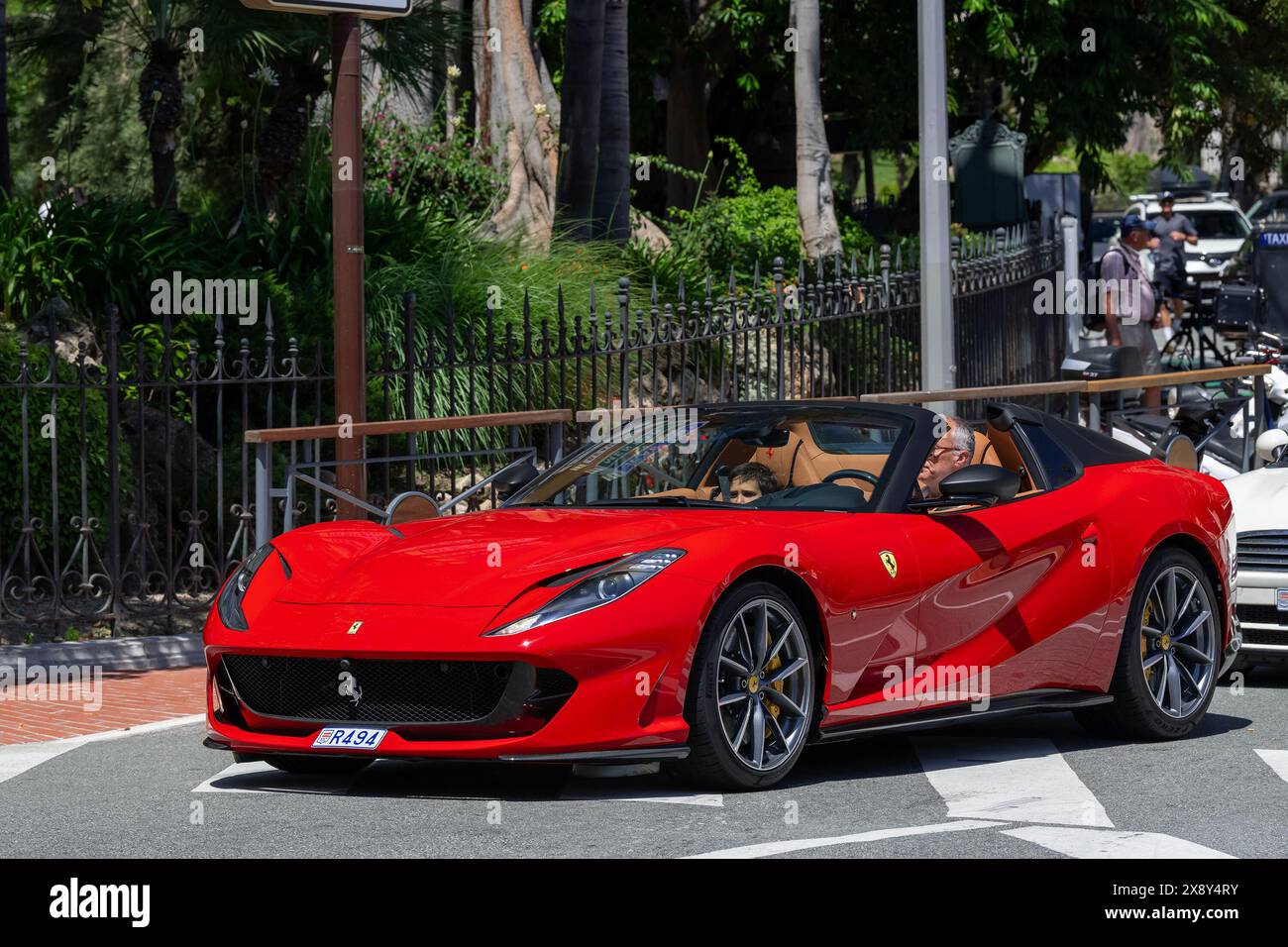 Monte Carlo, Monaco - View on a red Ferrari 812 GTS driving on a street ...
