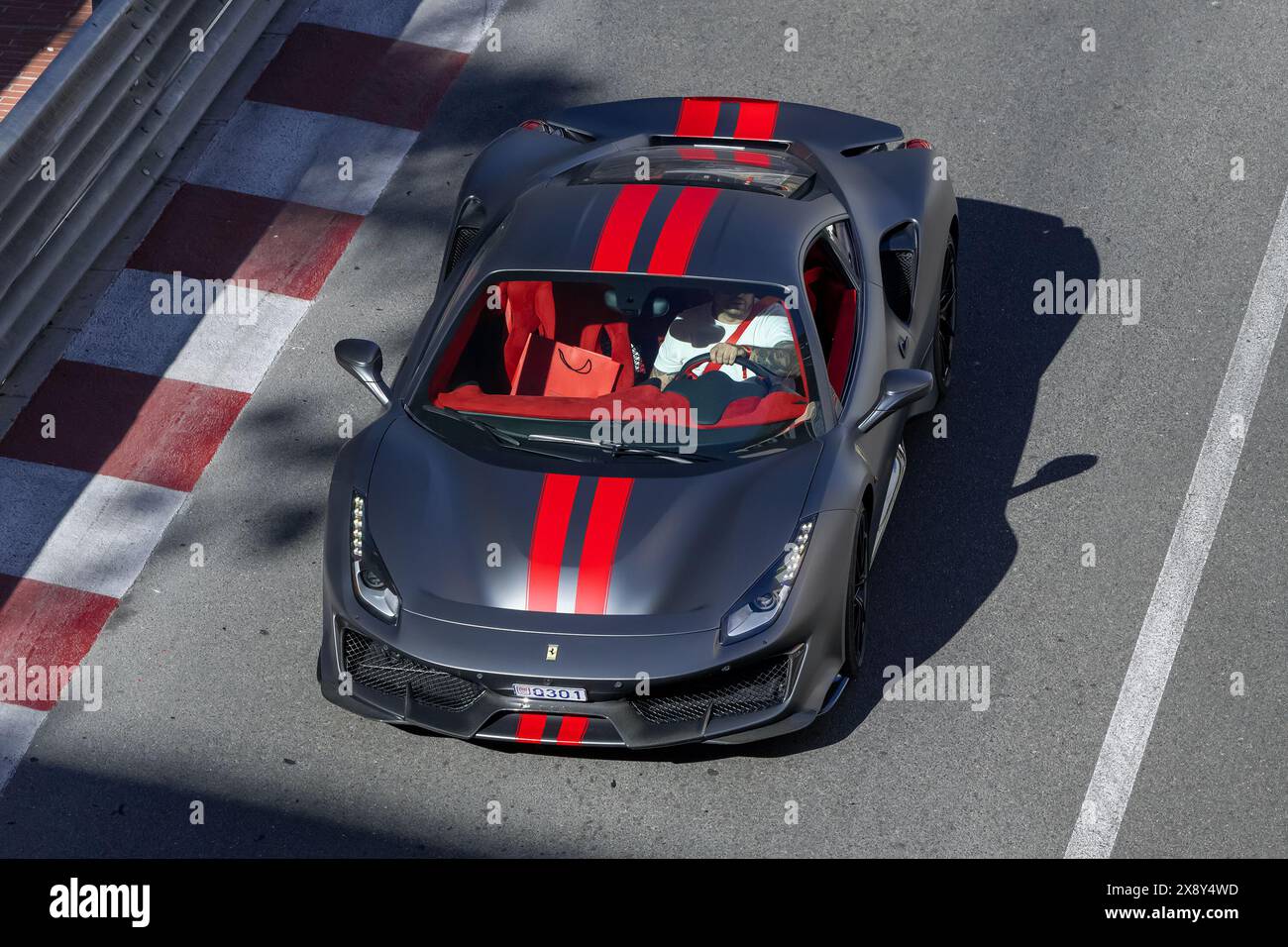 Monte Carlo, Monaco - View on a matte grey Ferrari 488 Pista driving on ...