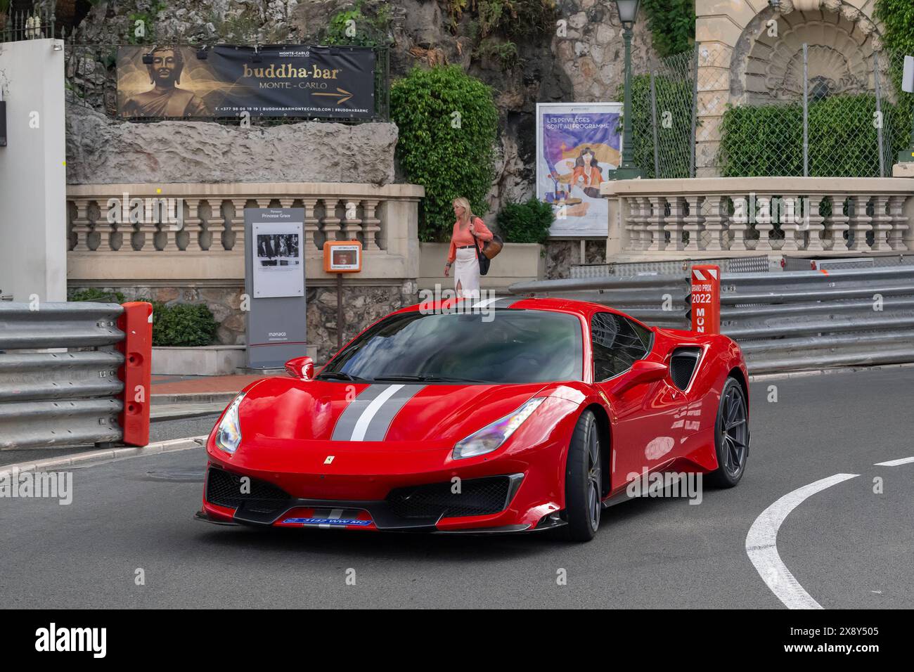 Monte Carlo, Monaco - View on a red Ferrari 488 Pista driving on the ...