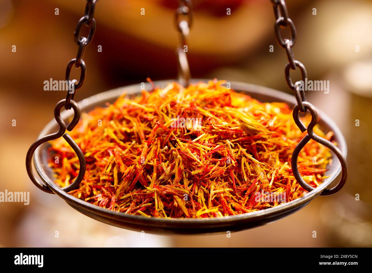 dried saffron spice in vintage balance scale Stock Photo - Alamy