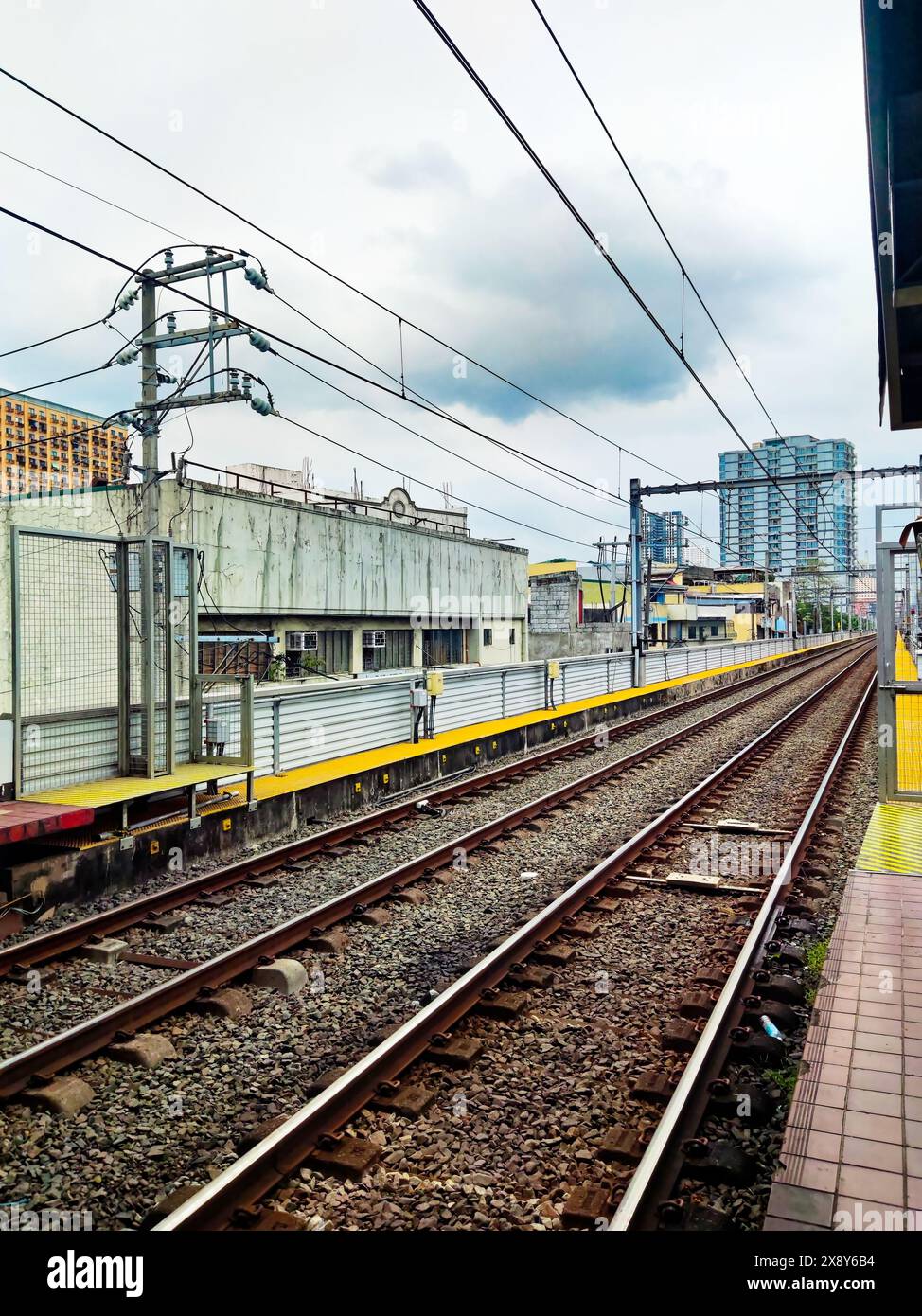 An empty segment of the Light Rail Transit (LRT) system in Manila, with ...