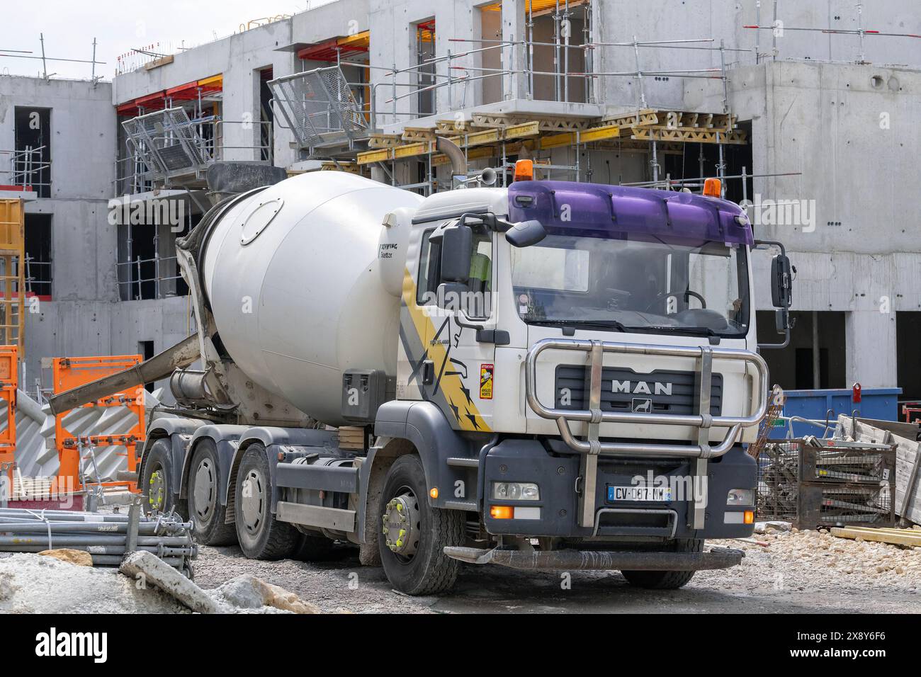 Nancy, France - White and green truck mixer MAN TGA 35.400 delivering ...