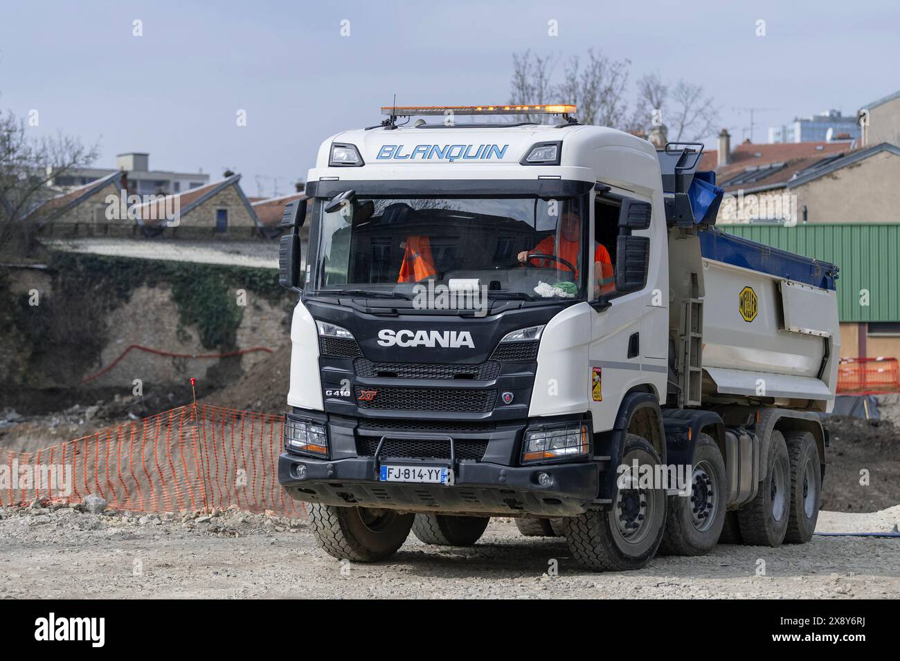 Nancy, France - View on a white dump truck Scania G410 XT for earthwork on a construction site ...