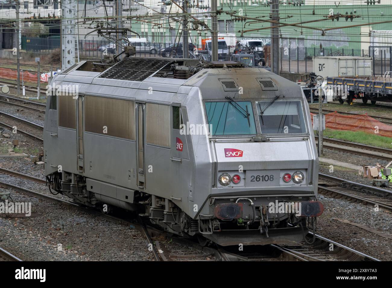Nancy, France - View on a grey electric locomotive SNCF Class BB 26000 crossing Nancy station ...