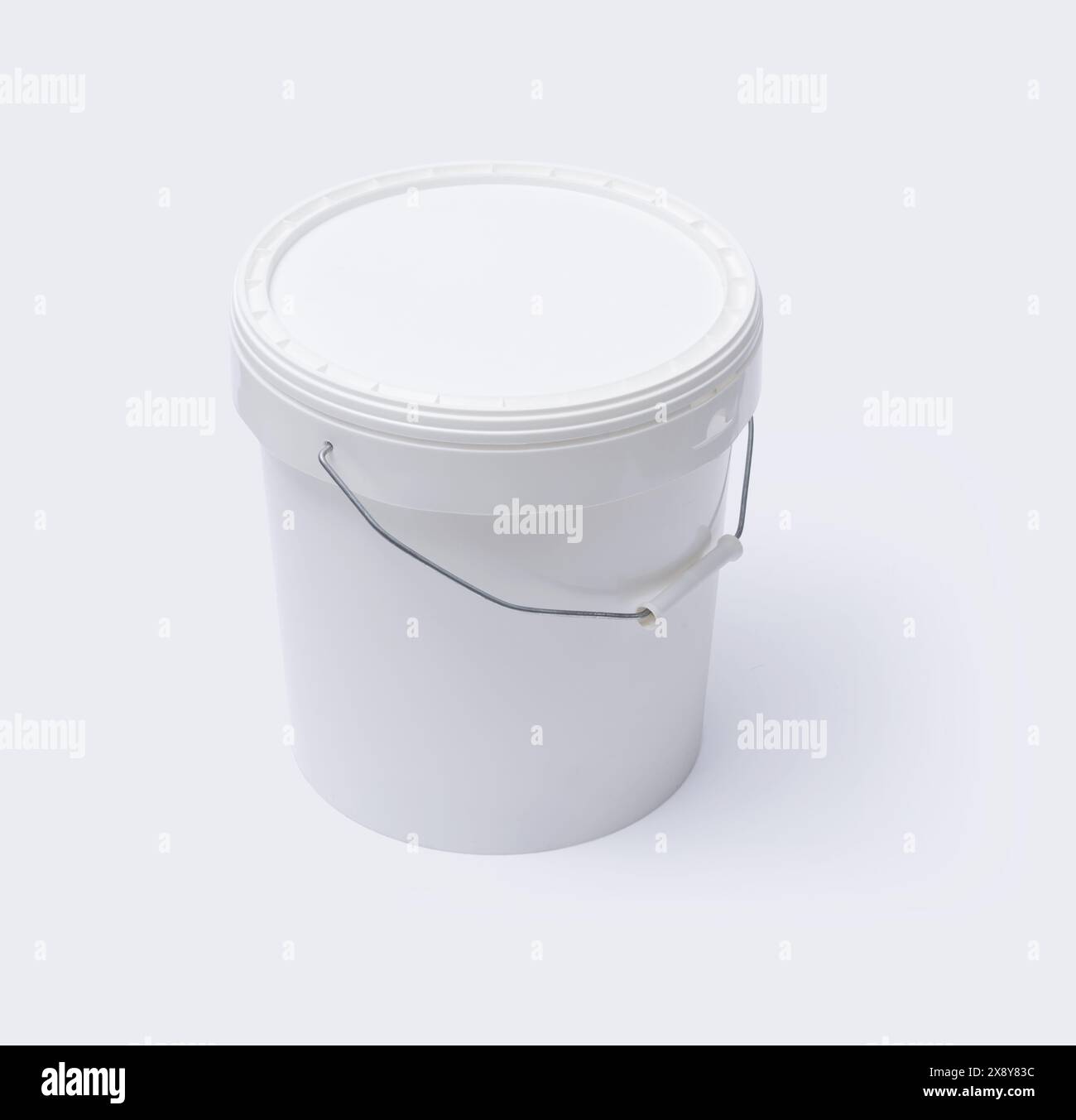 Large plastic paint bucket with handle, isolated on white background ...