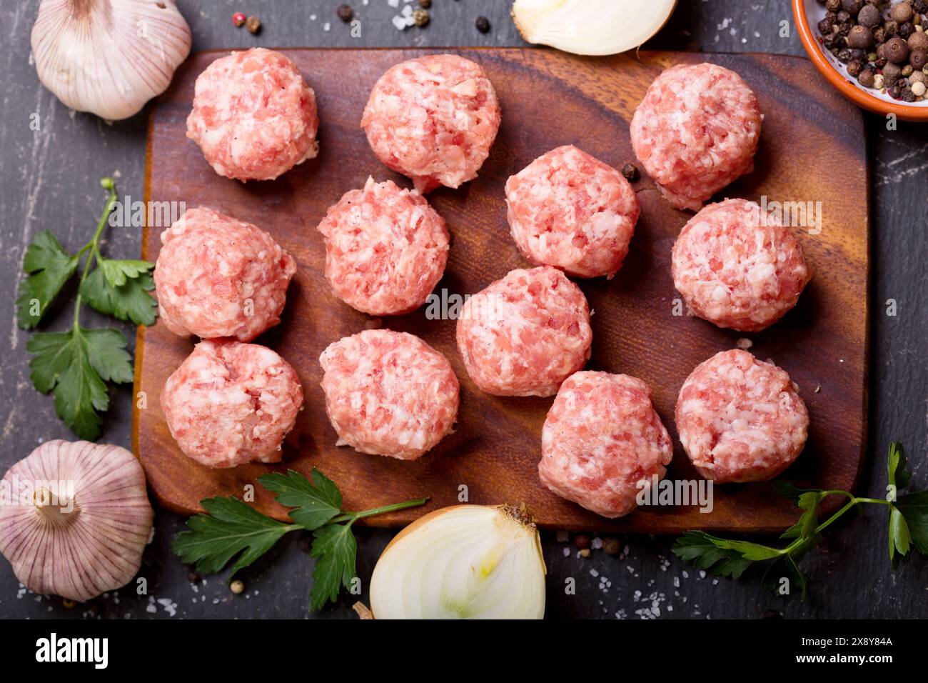 Raw meatballs on dark hi-res stock photography and images - Alamy