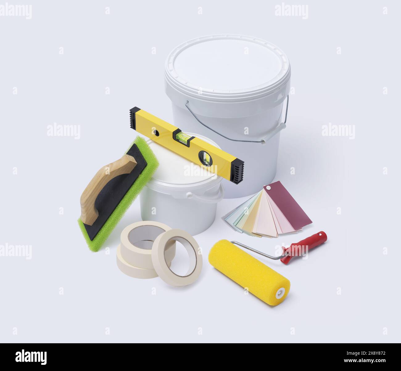 Set of professional painting tools and paint buckets, isolated on white ...