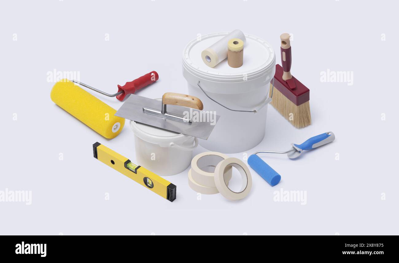 Set of professional painting tools and paint buckets, isolated on white ...