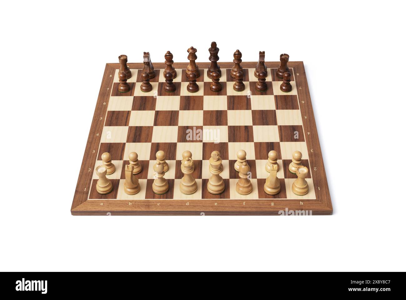 Wooden chessboard with chess pieces ready for the game isolated on ...