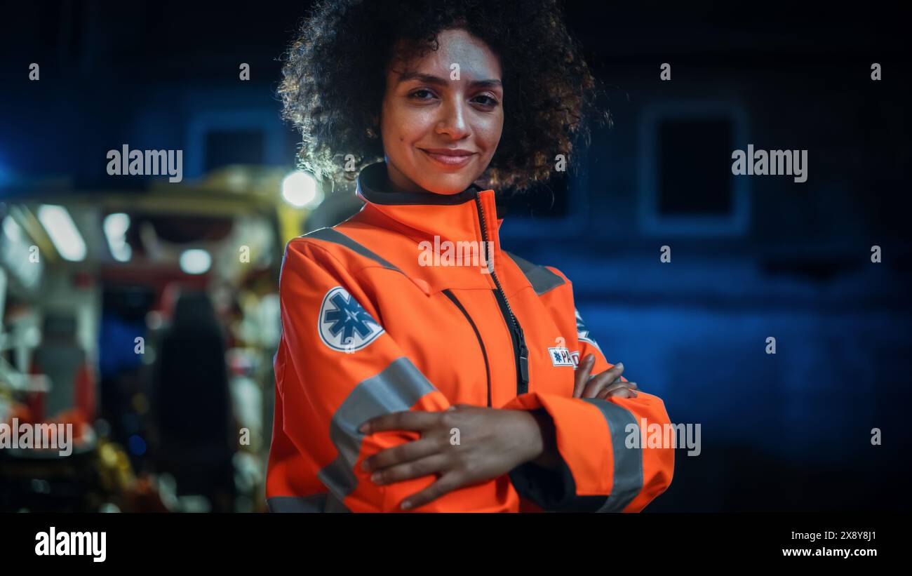 Smiling Female Paramedic Looking at Camera and Posing with Crossed ...