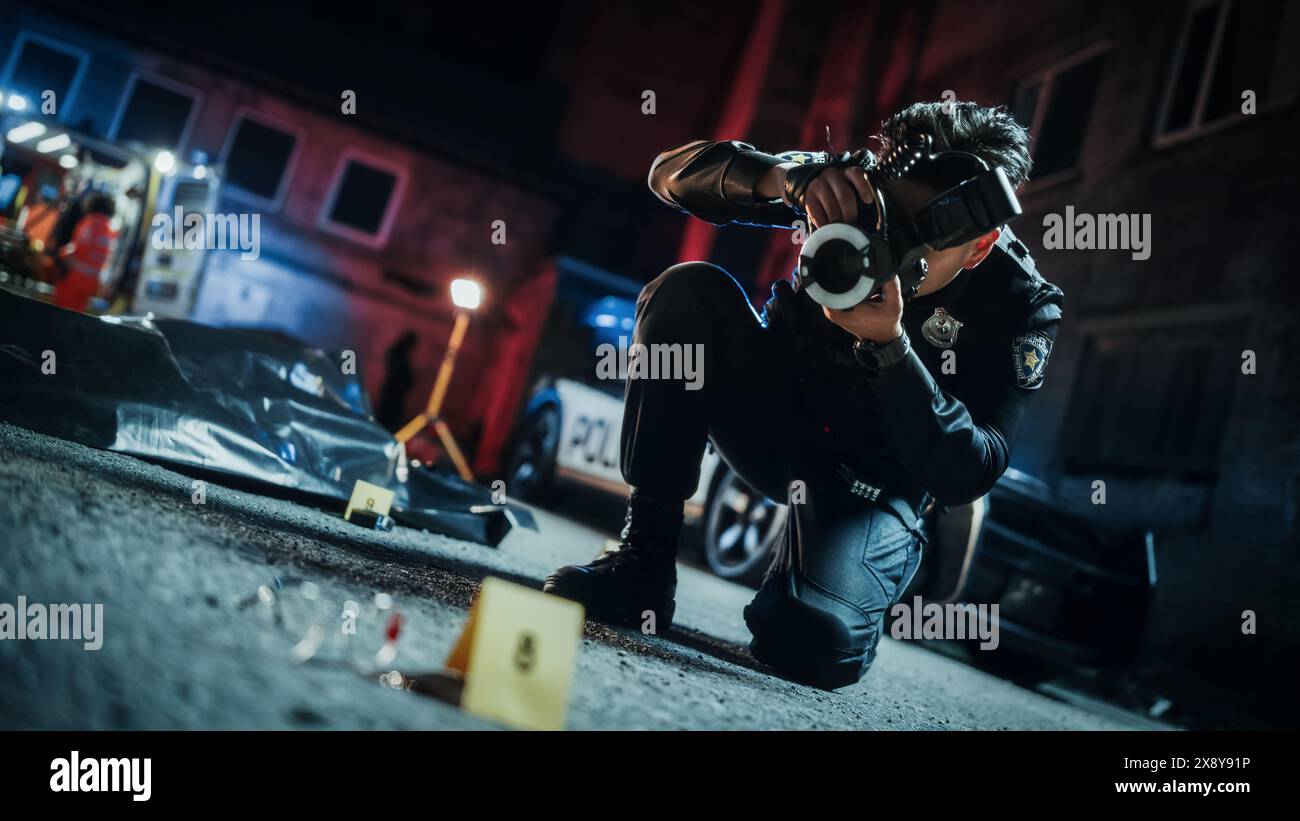 Tilted Shot: Asian Policeman Taking Pictures of Marked Evidence, the ...