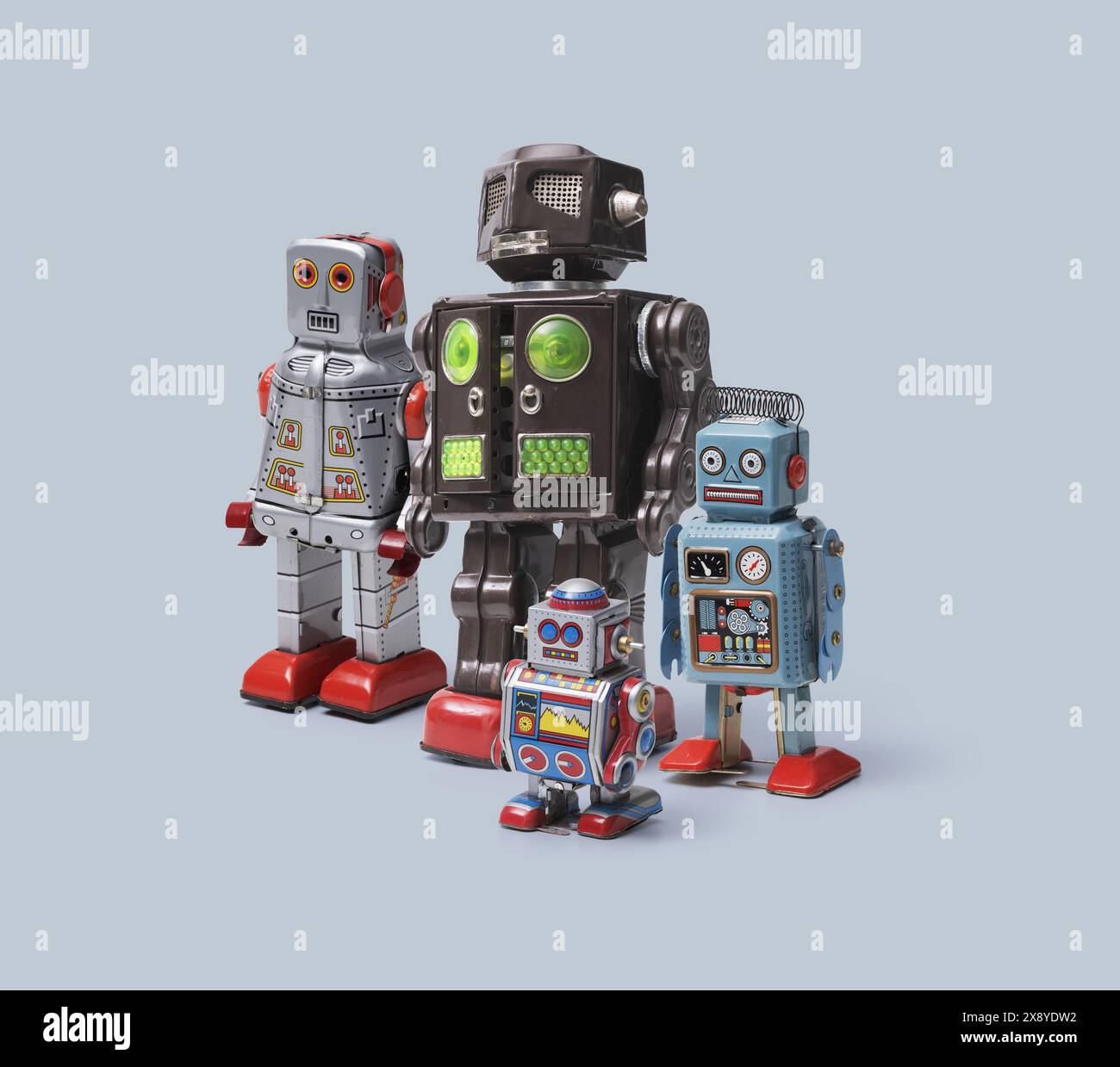 Vintage tin toy robots standing together, vintage mechanical toys and ...