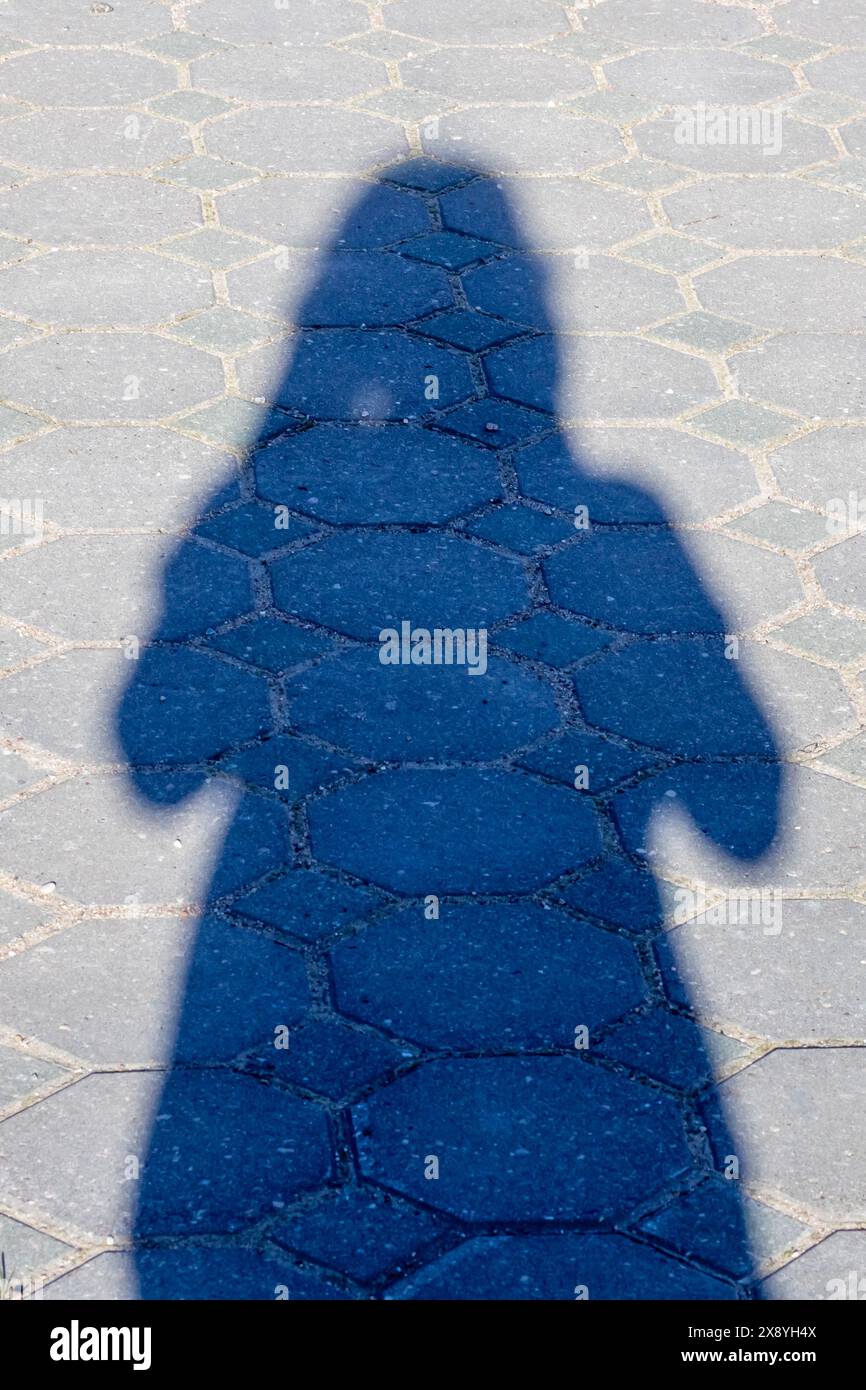 Walking womans shadow on stone hi-res stock photography and images - Alamy